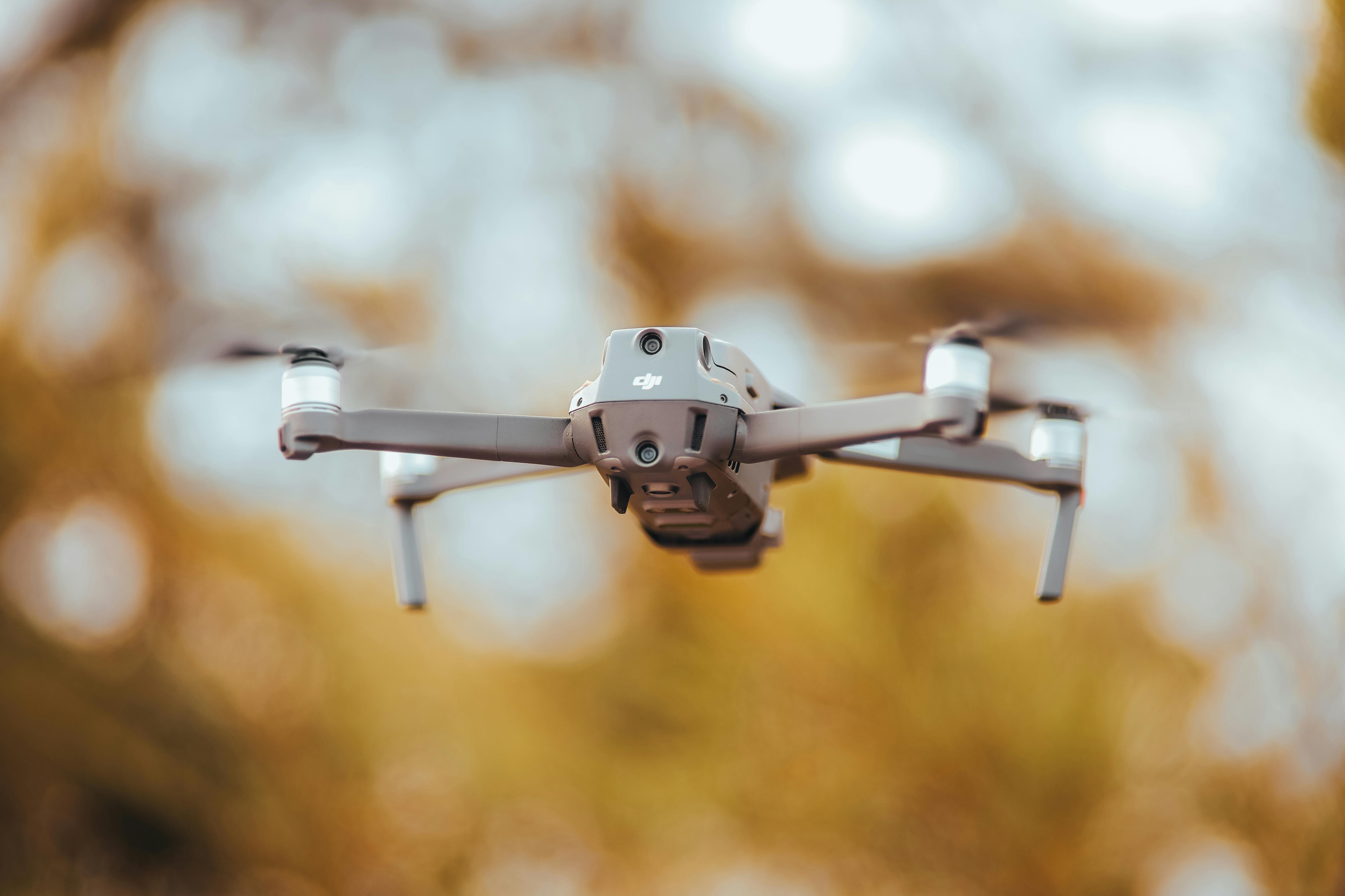 Close-Up Shot of a Flying Drone Camera · Free Stock Photo