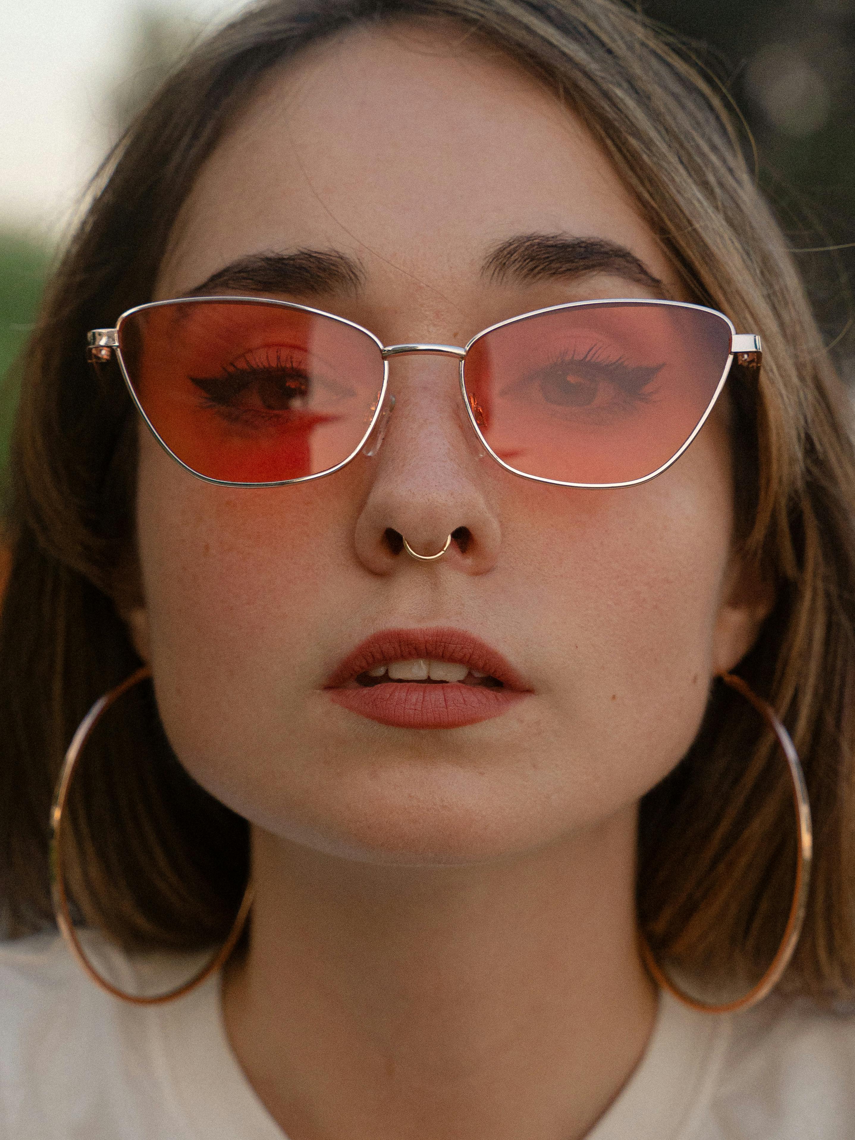Woman in Black Jacket Wearing Sunglasses Standing Near Window · Free ...