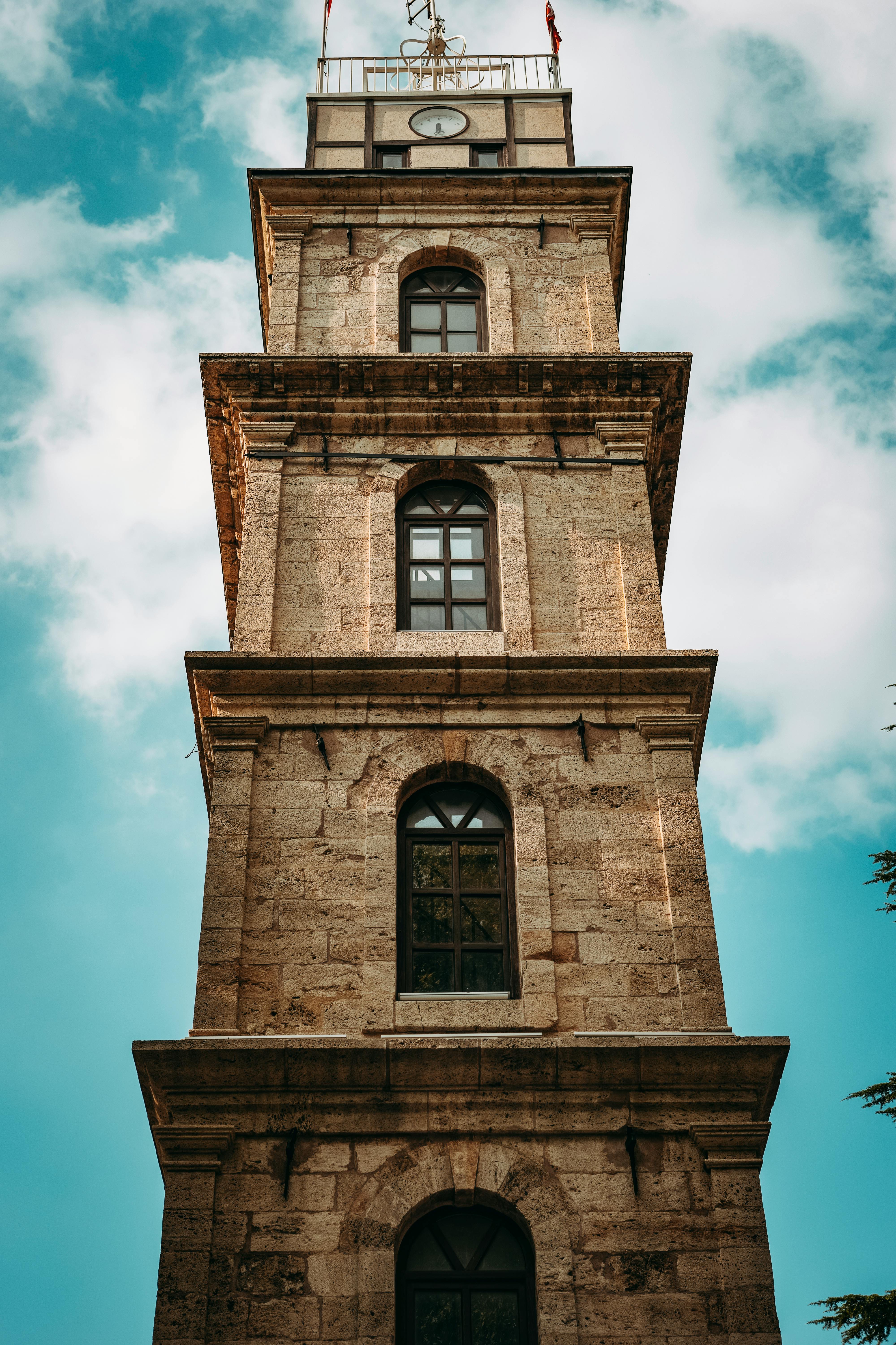 Tophane Clock Tower in Bursa, Turkey Under White Clouds · Free Stock Photo