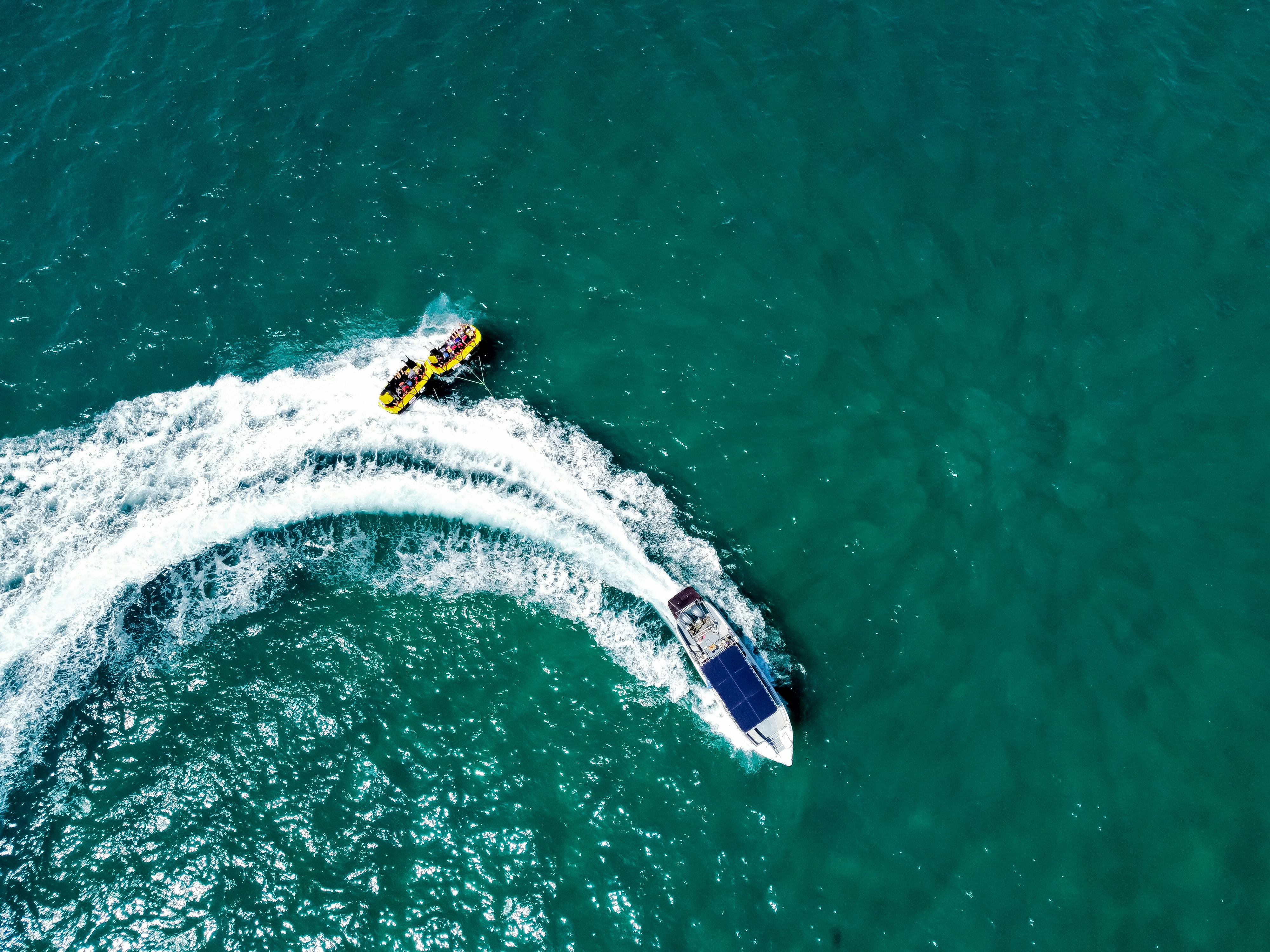 People Riding Inflatable Boats · Free Stock Photo