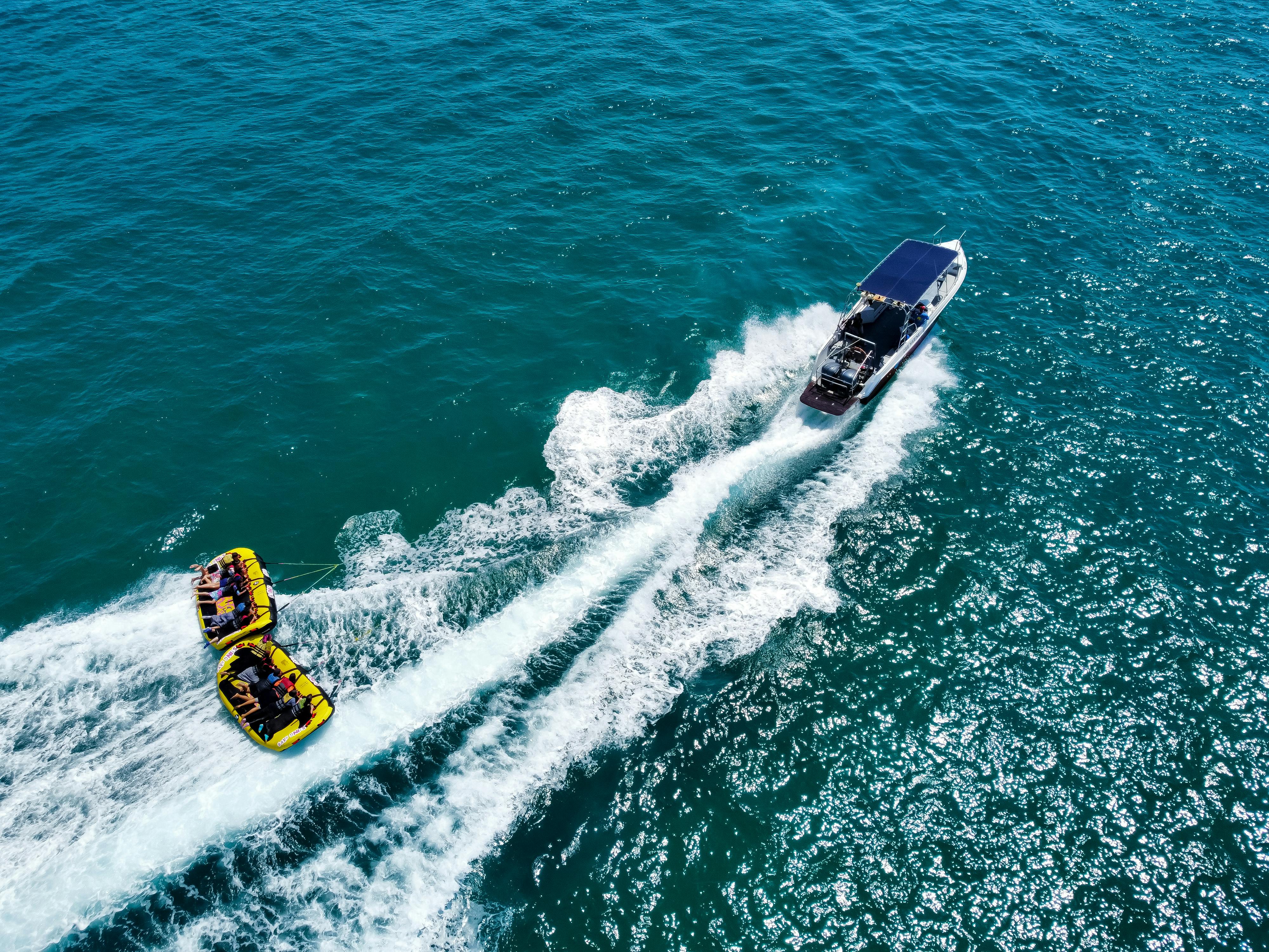 People Riding Inflatable Boats · Free Stock Photo