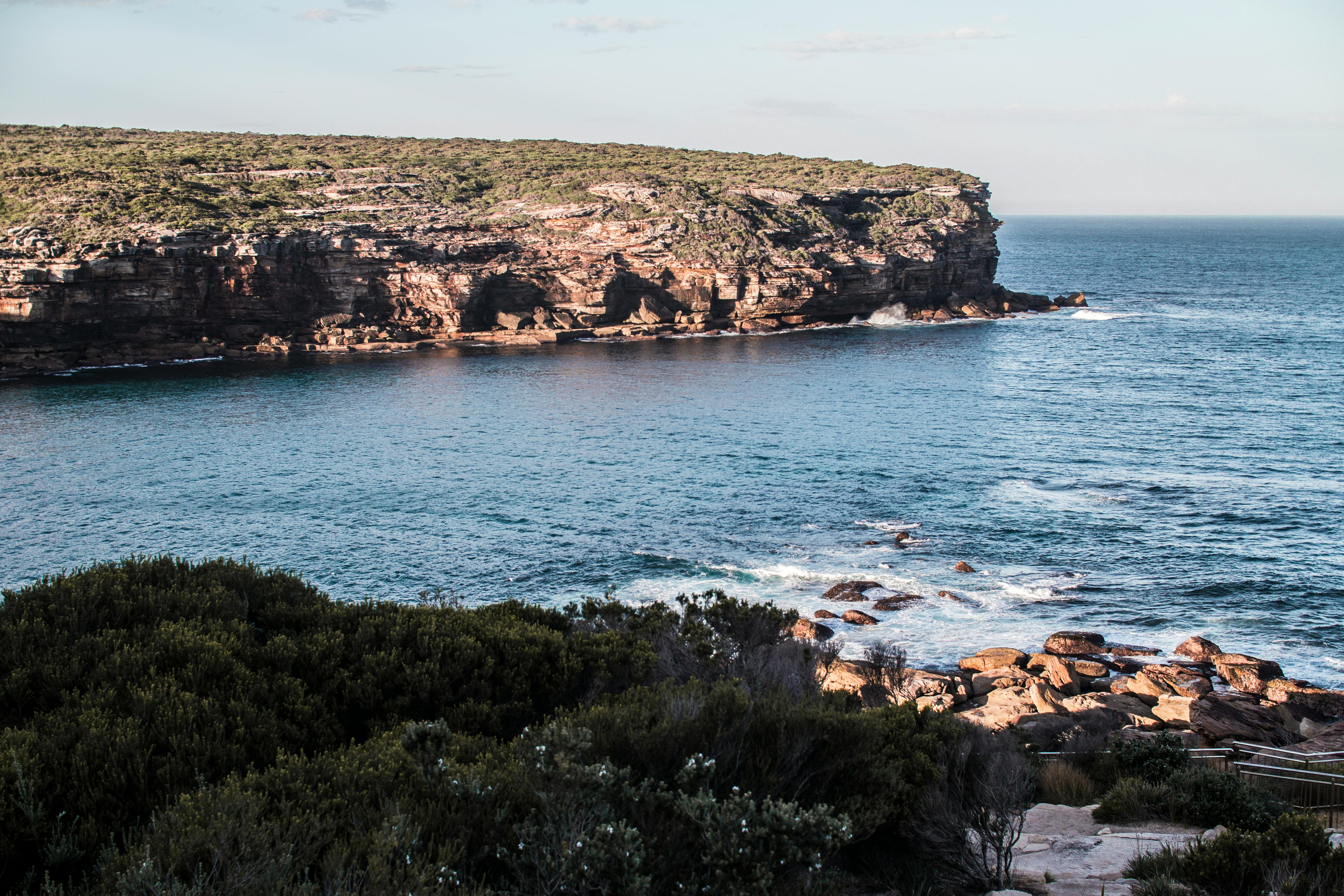 Photo of Cliff on Beach during Daytime · Free Stock Photo