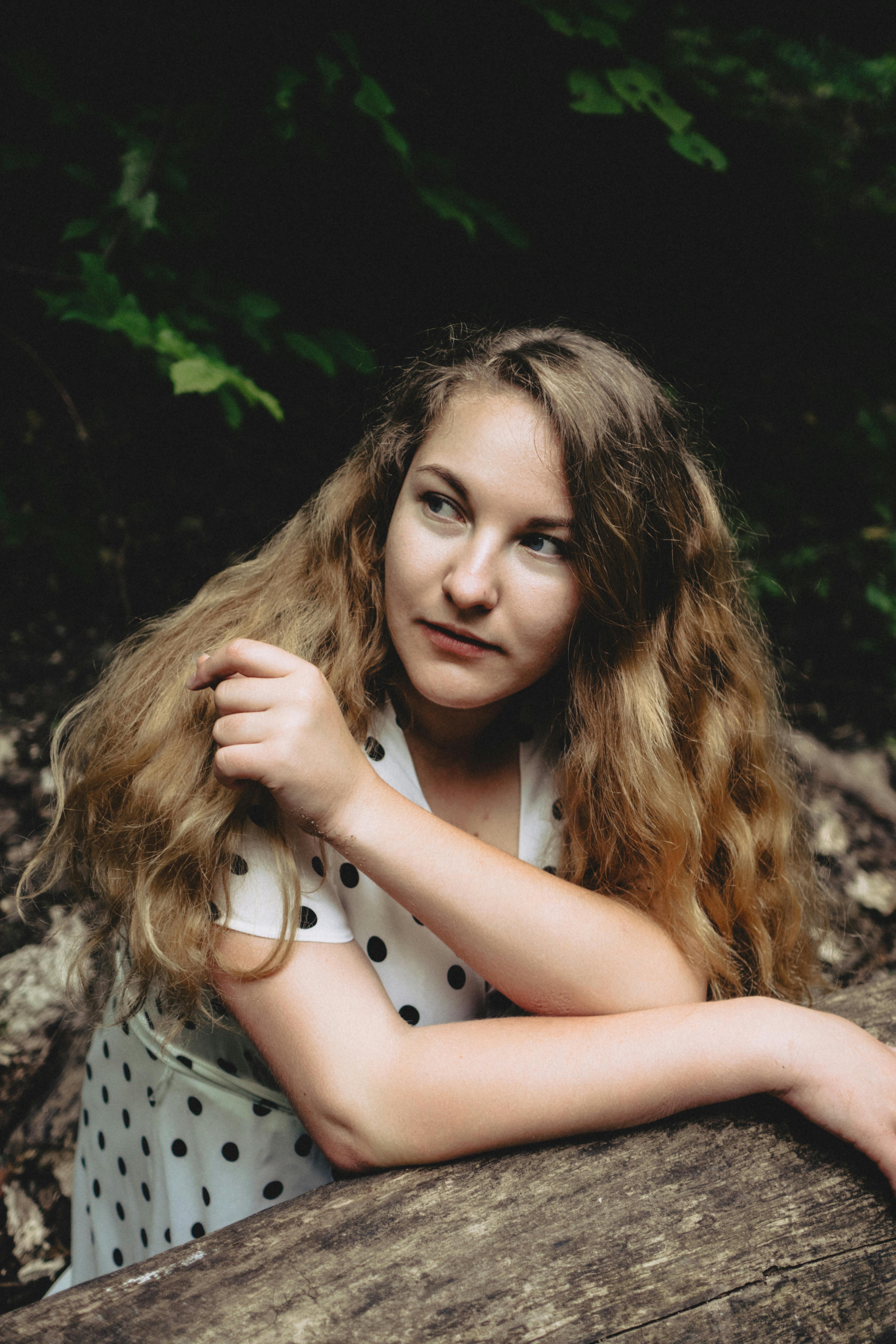 Long Exposure Portrait of a Model in a Black Chiffon Blouse with Polka ...