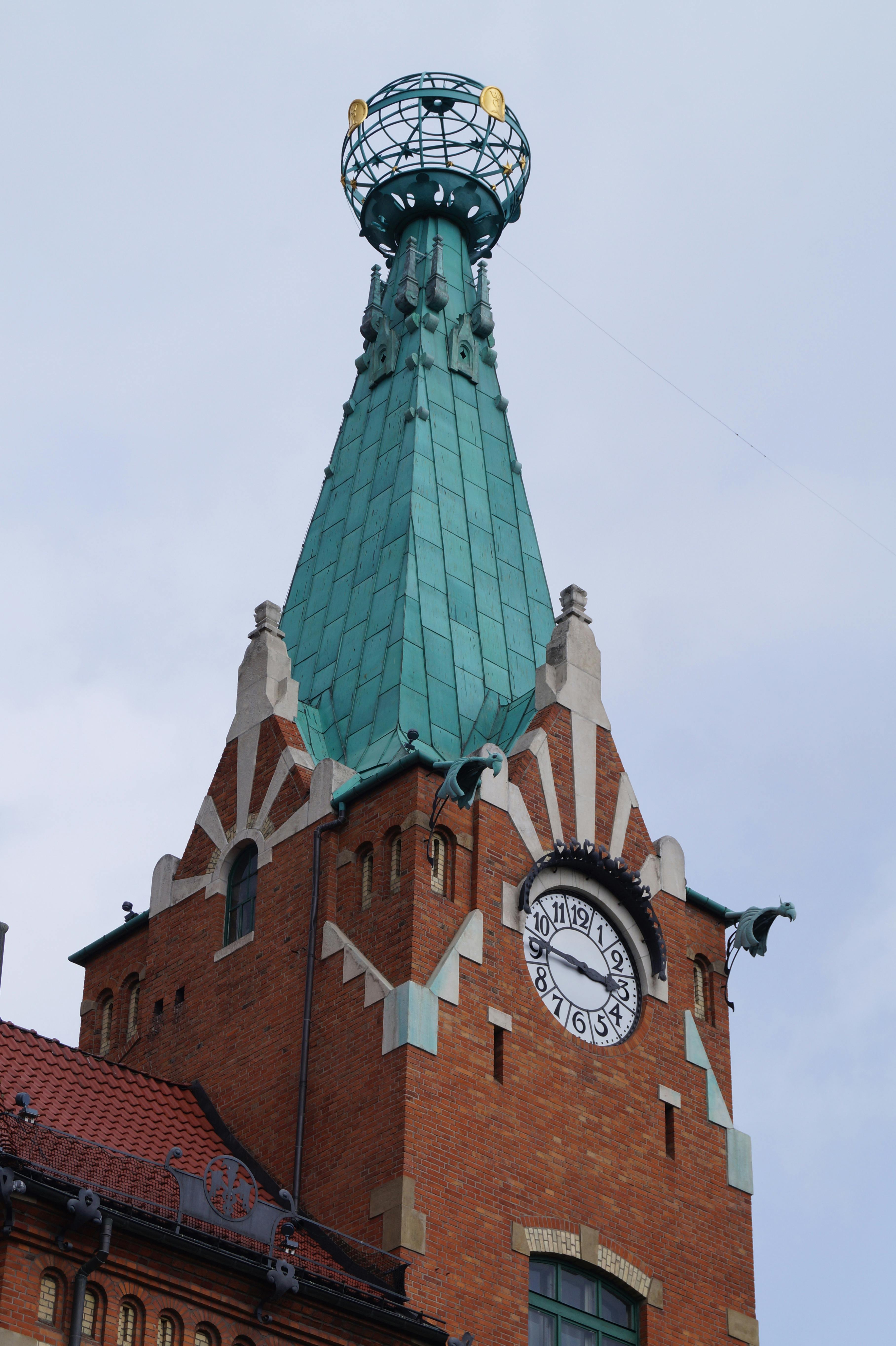 Clock Tower on Top of a Brick Building · Free Stock Photo