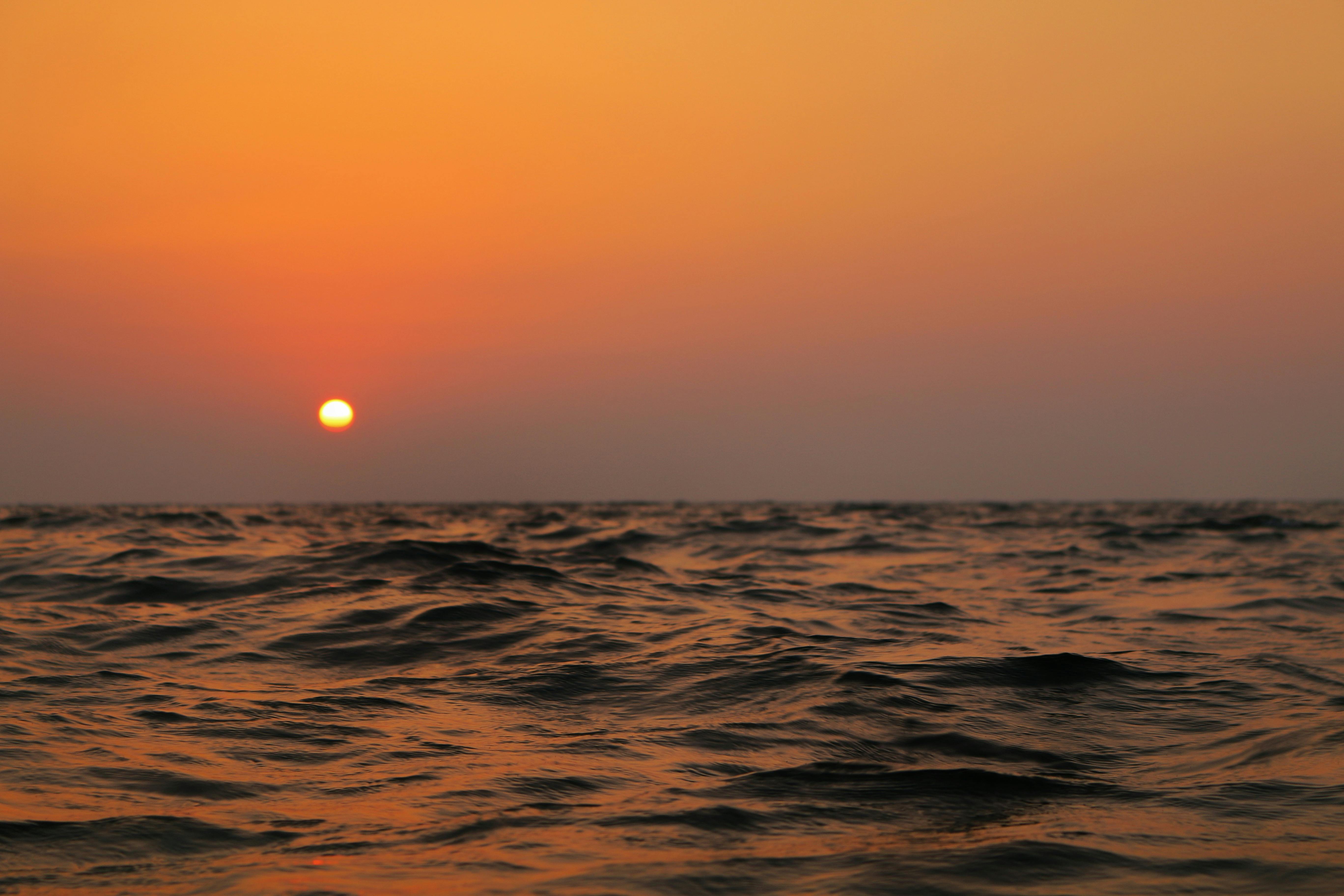 Body of Water during Sunset · Free Stock Photo