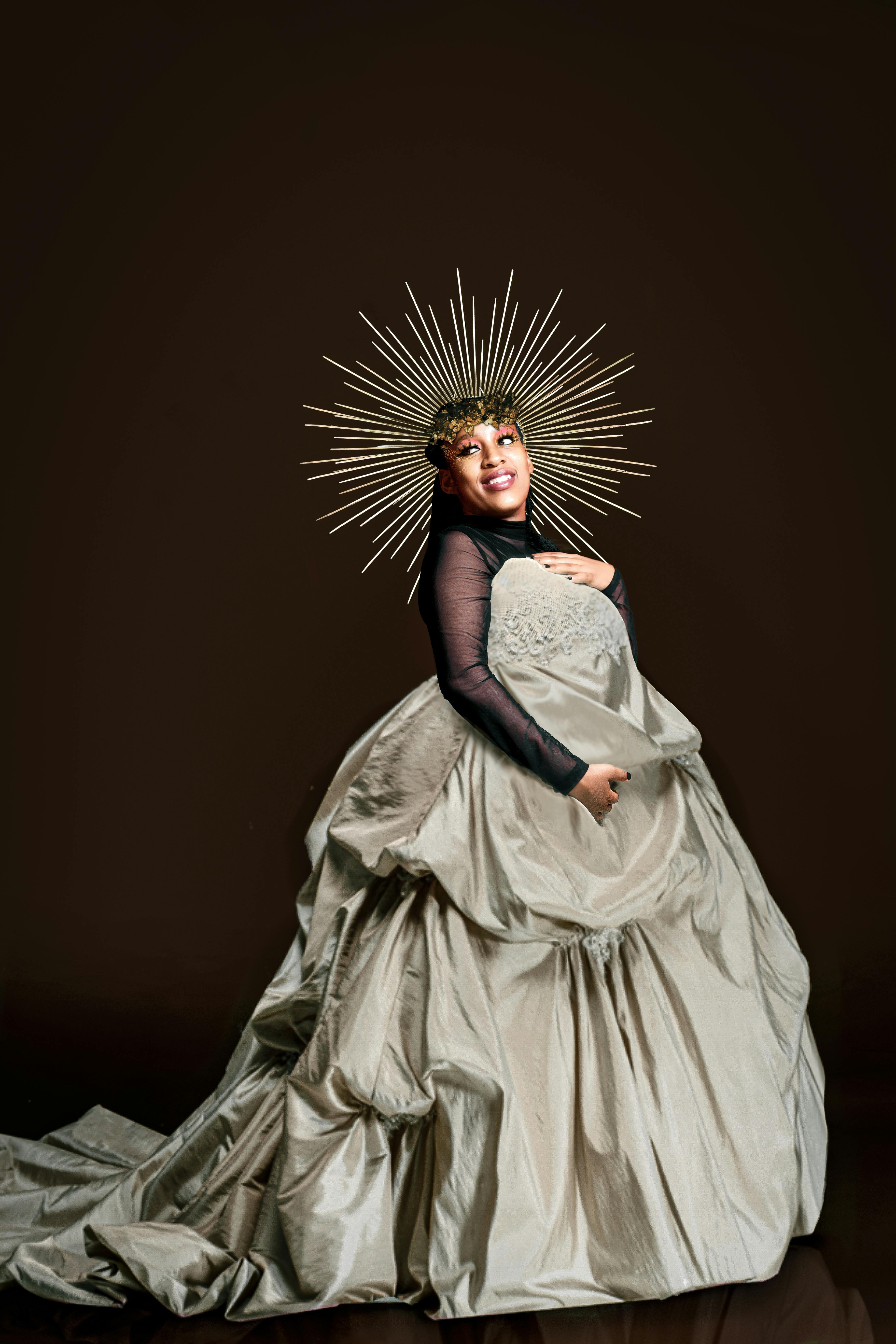 Woman Wearing a Ball Dress and a Spiky Crown · Free Stock Photo