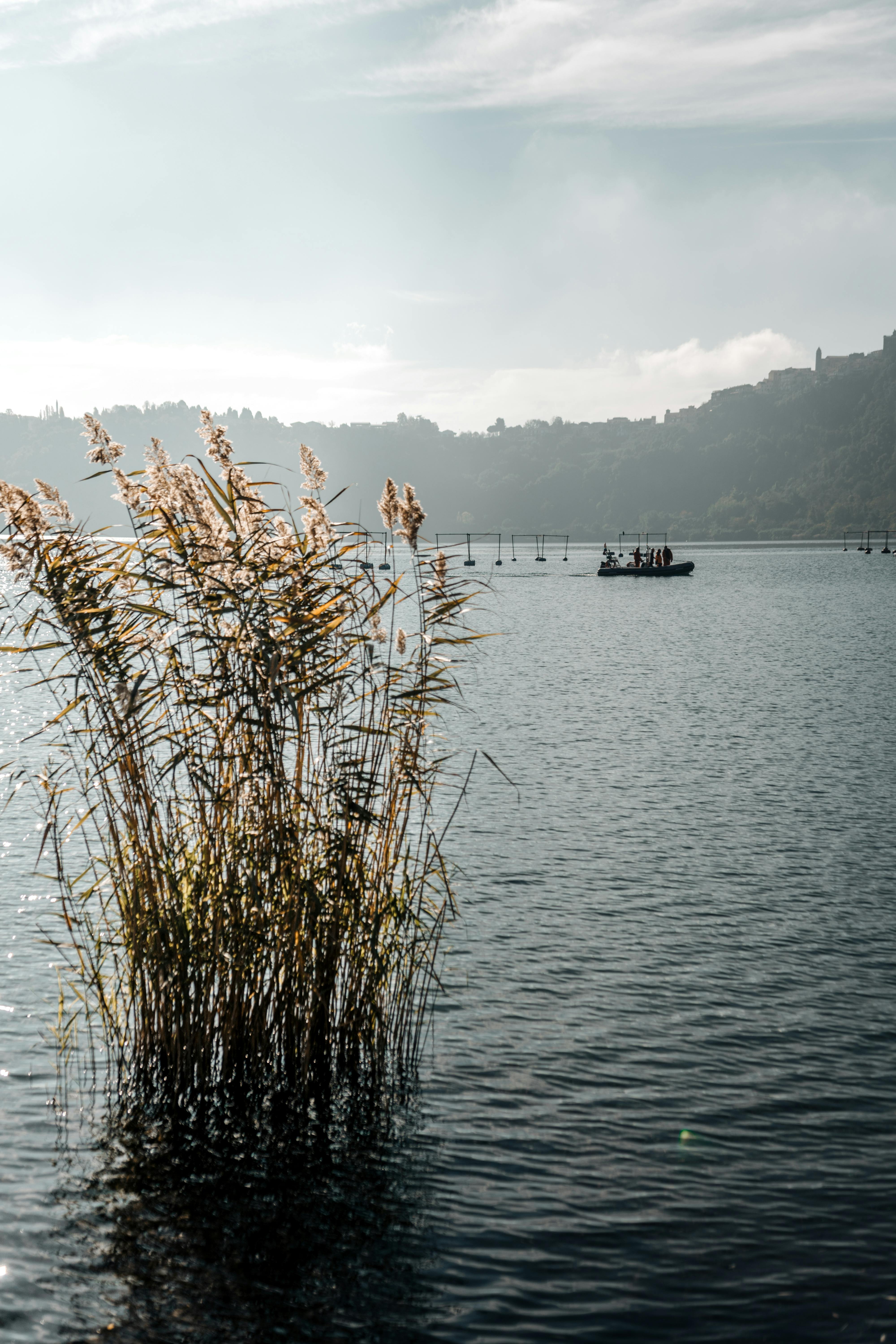 Blue Lake Surrounded by Brown Mountains · Free Stock Photo