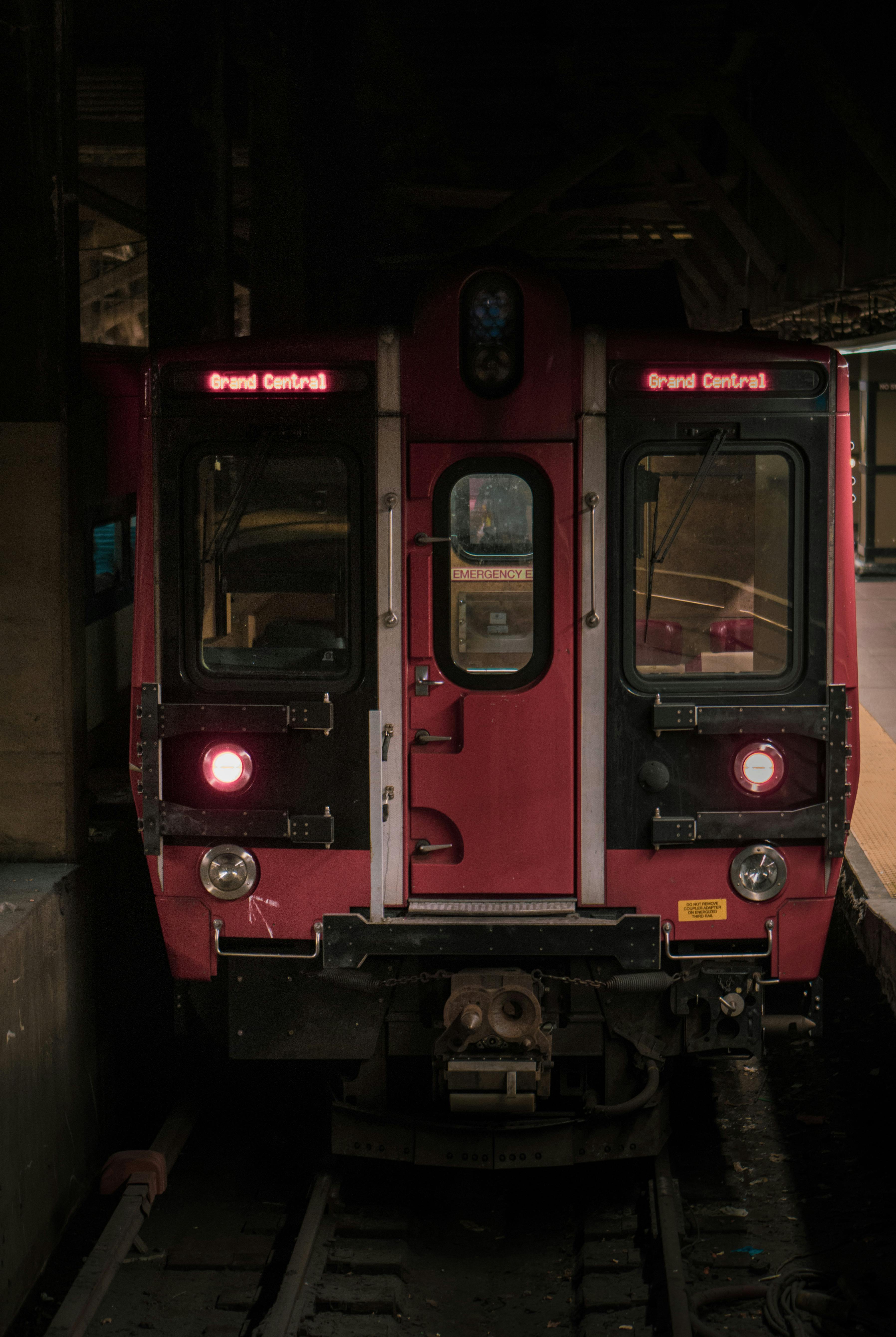Red and Black Train in a Tunnel · Free Stock Photo