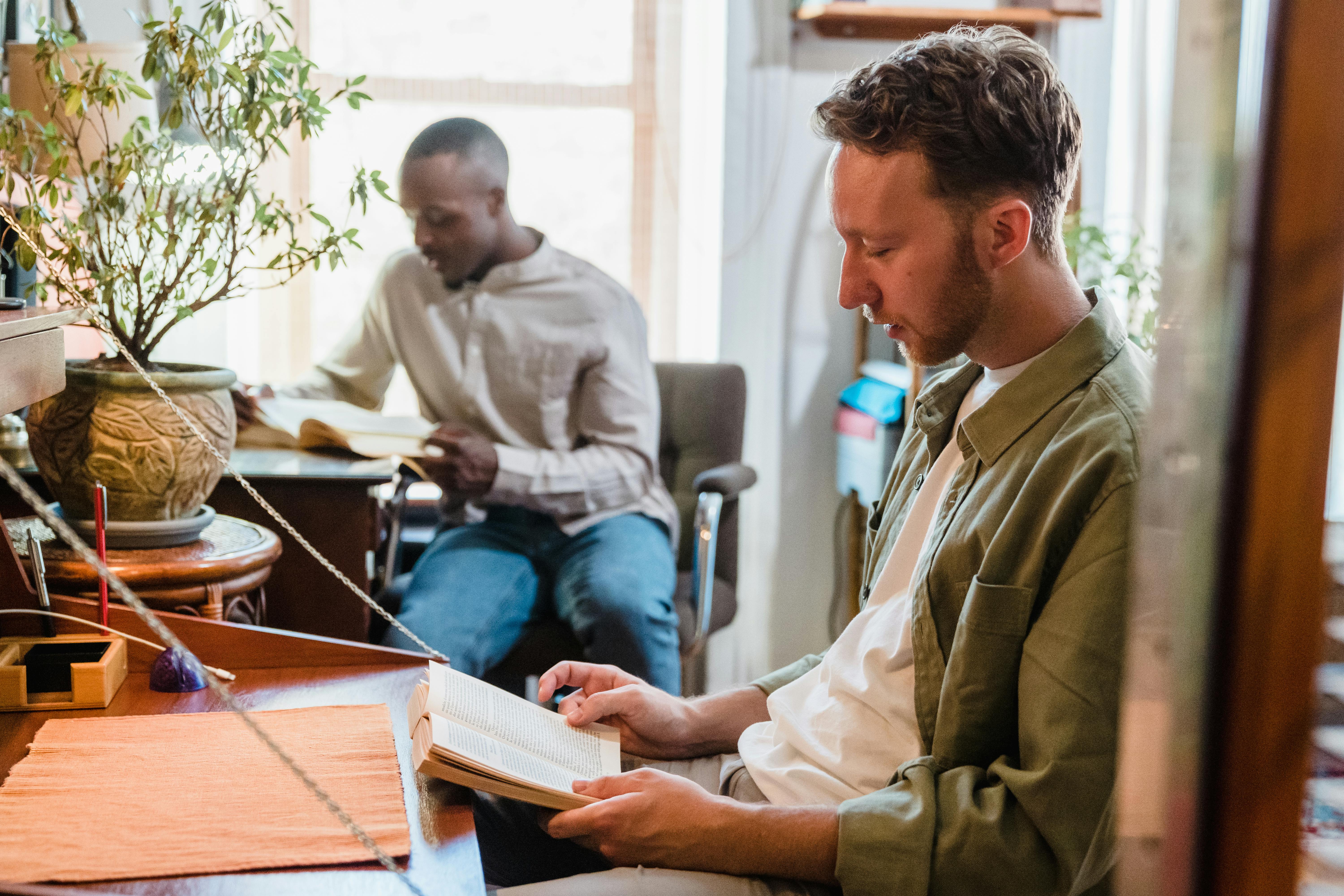 Two Men Reading Books · Free Stock Photo