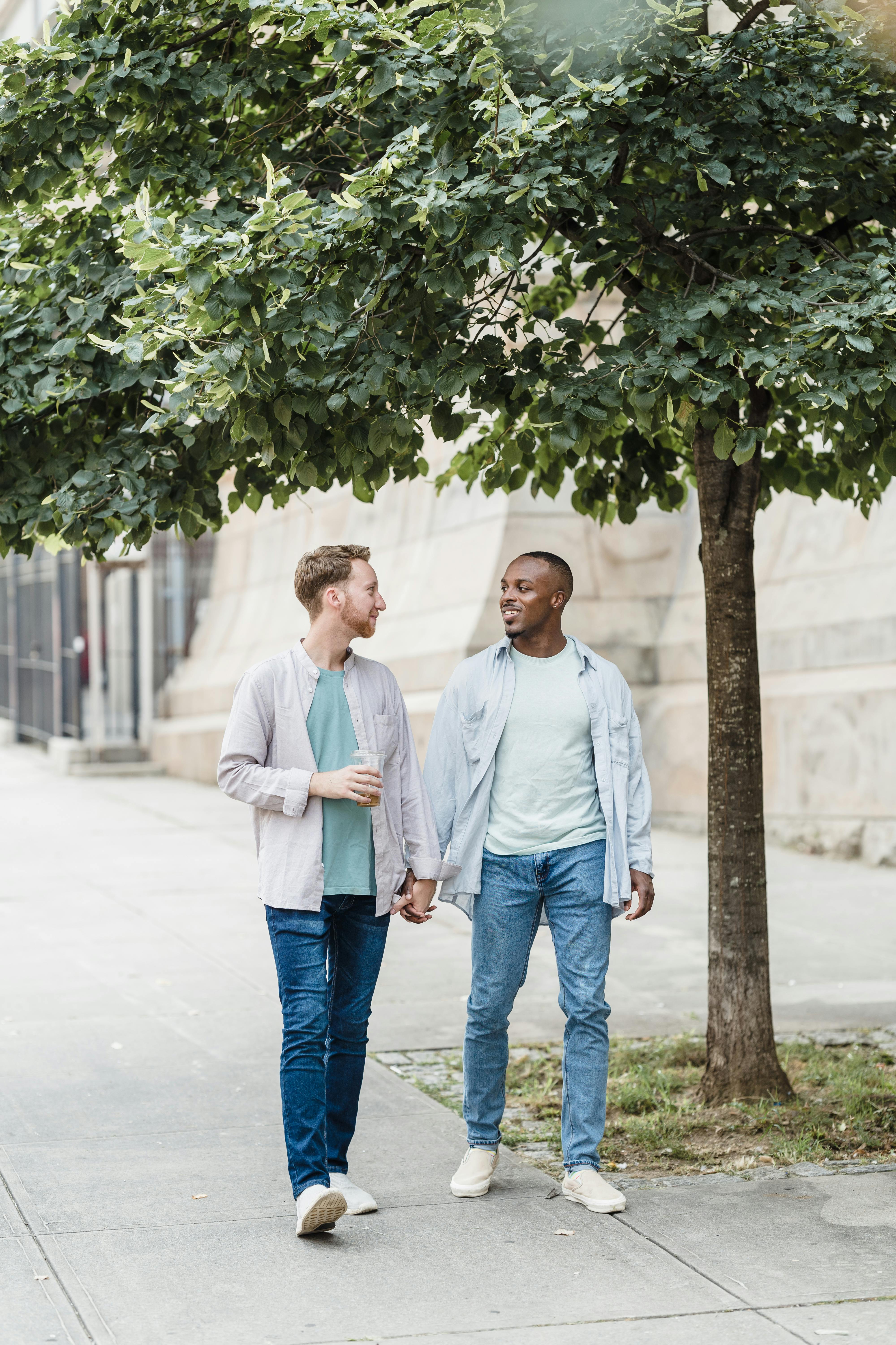 Two Men Walking on the Street · Free Stock Photo
