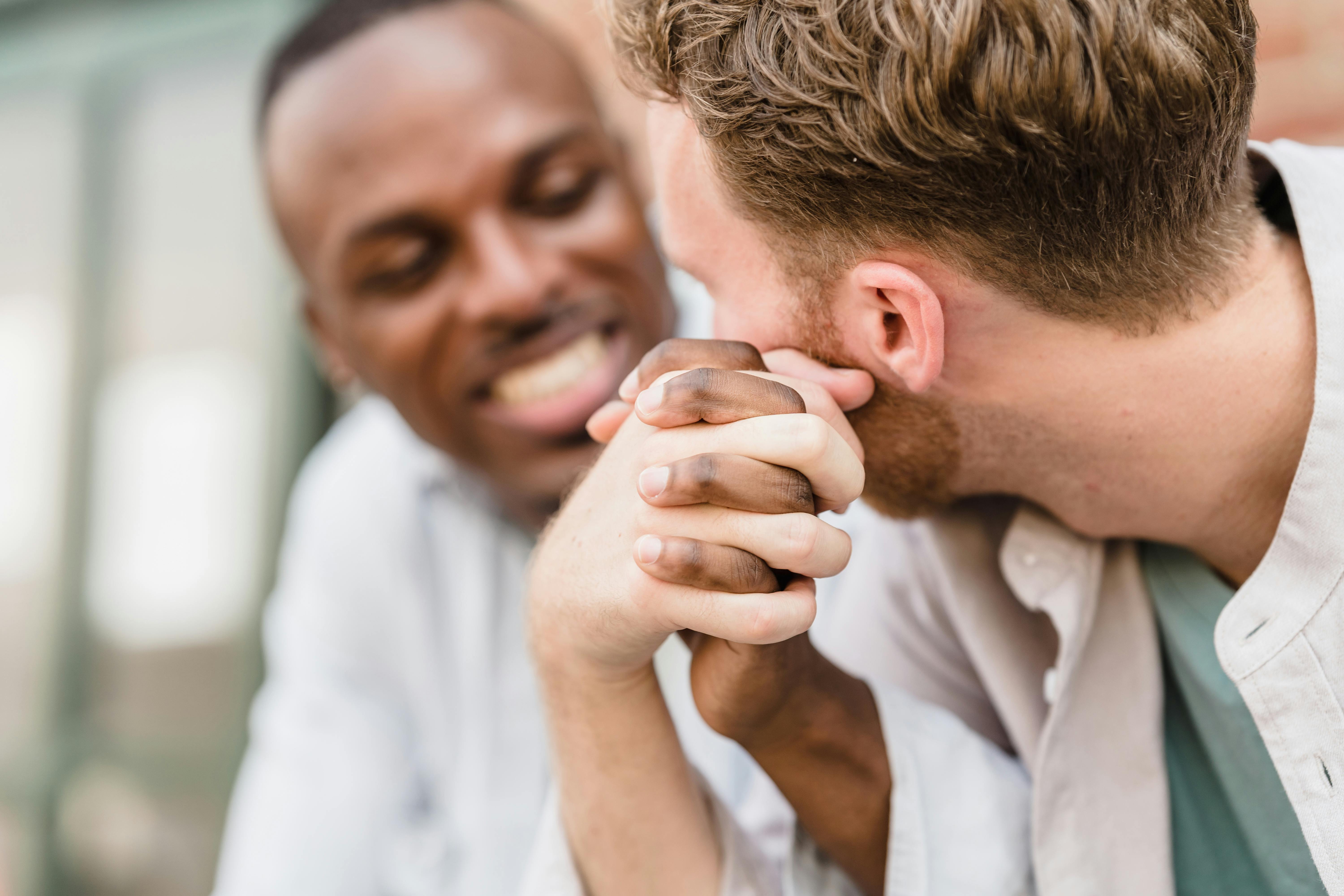 Two Men Holding Hands · Free Stock Photo