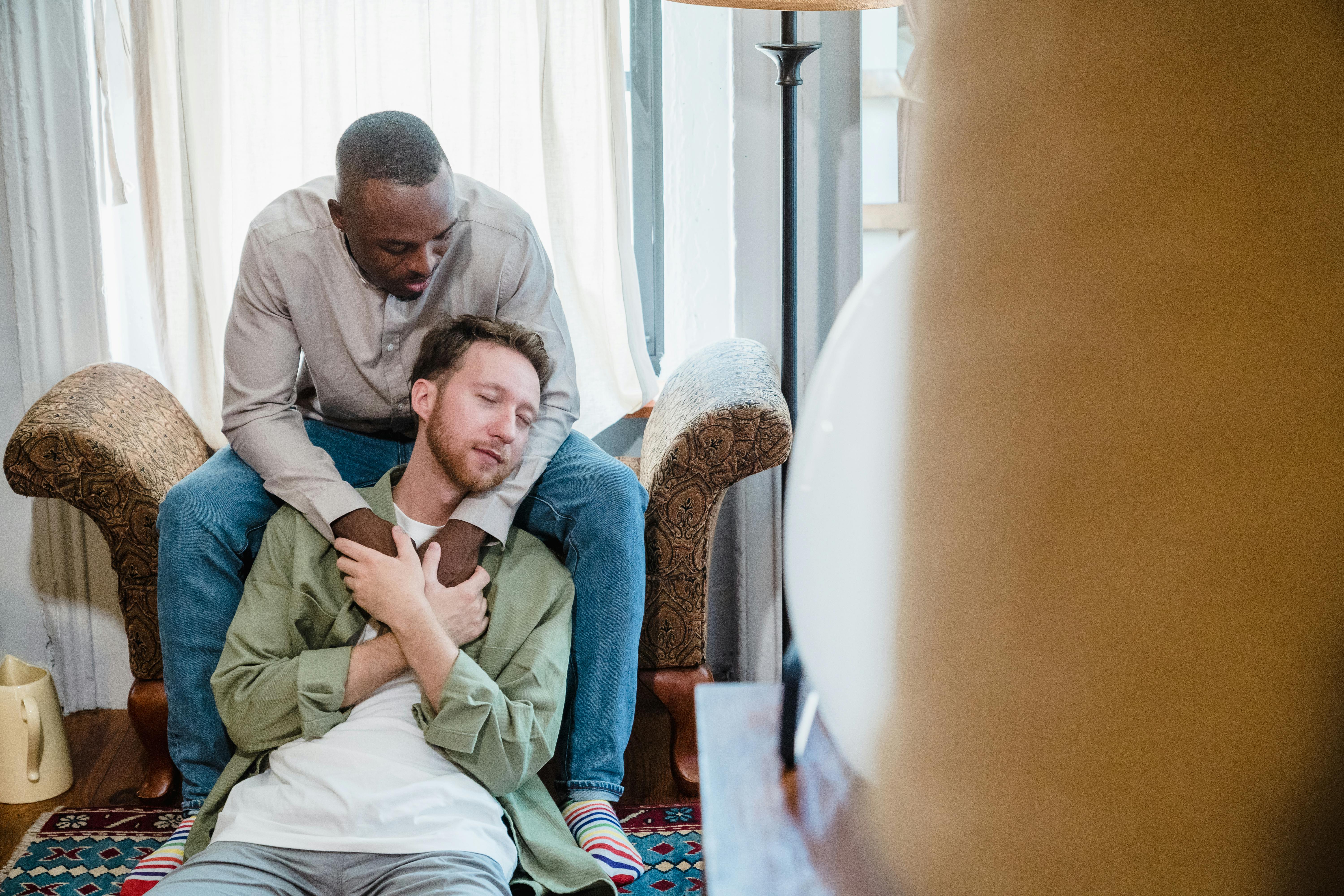 Men Hugging in Room · Free Stock Photo
