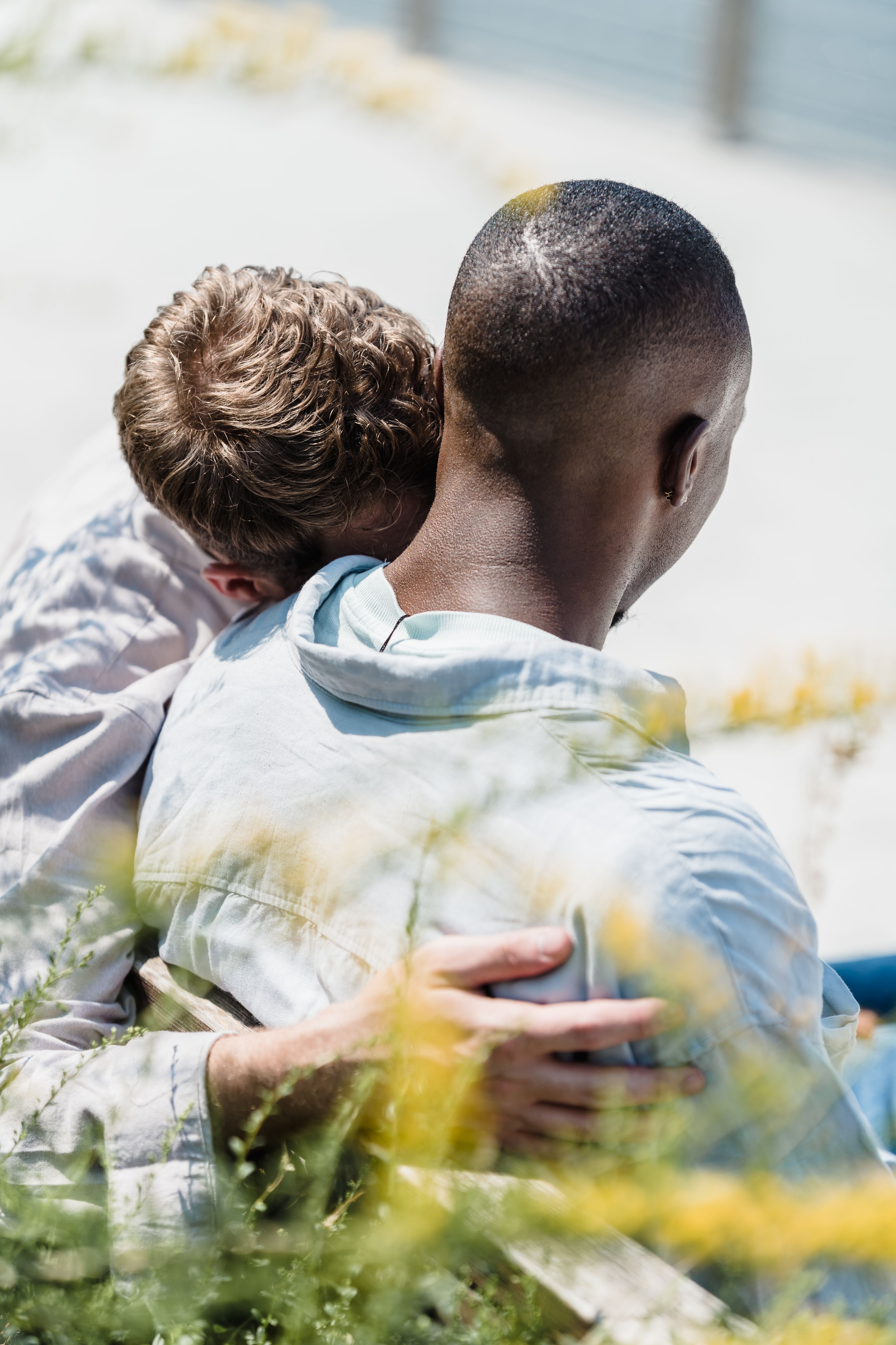 Back View of Men Hugging · Free Stock Photo