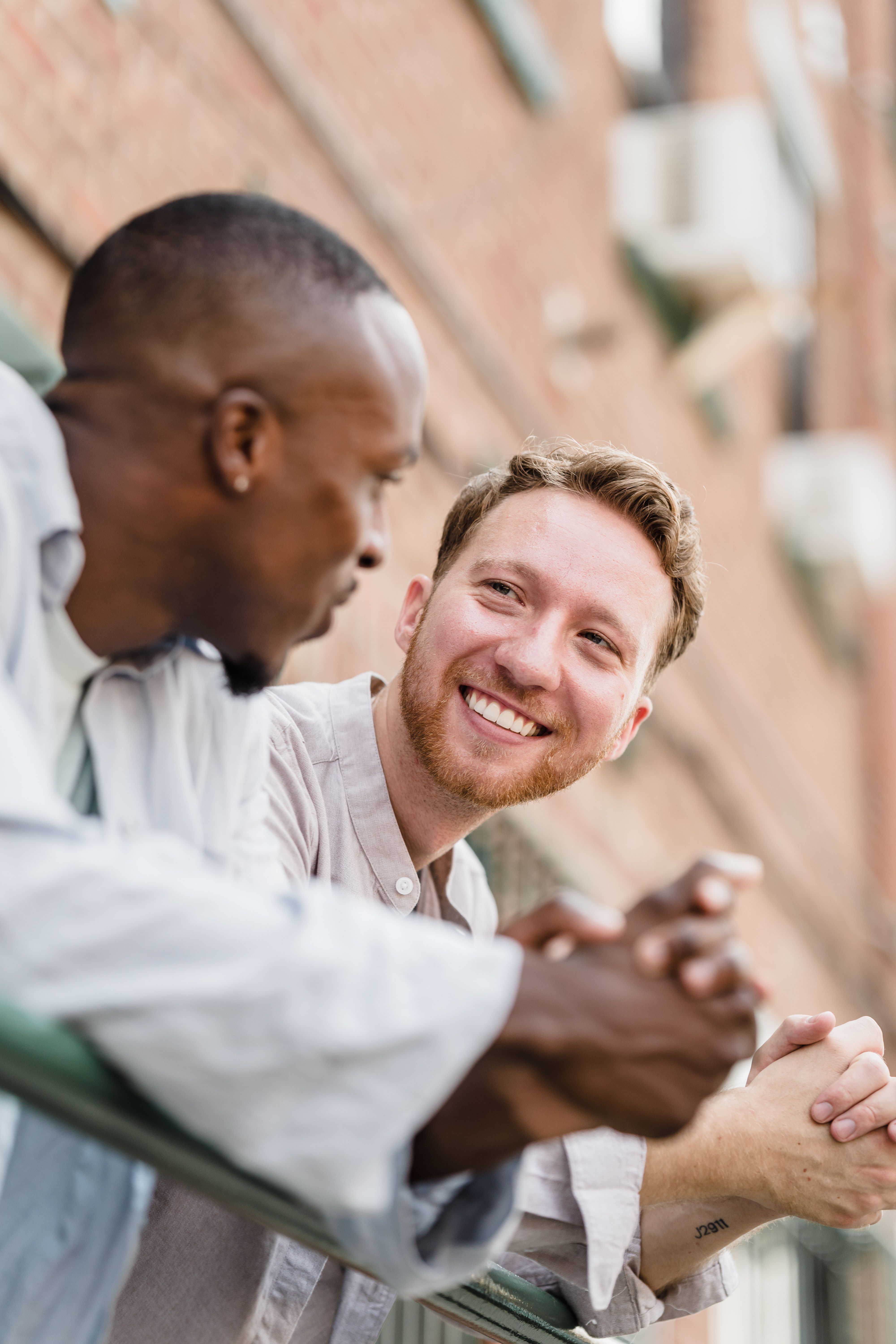 Faces of Smiling Men · Free Stock Photo
