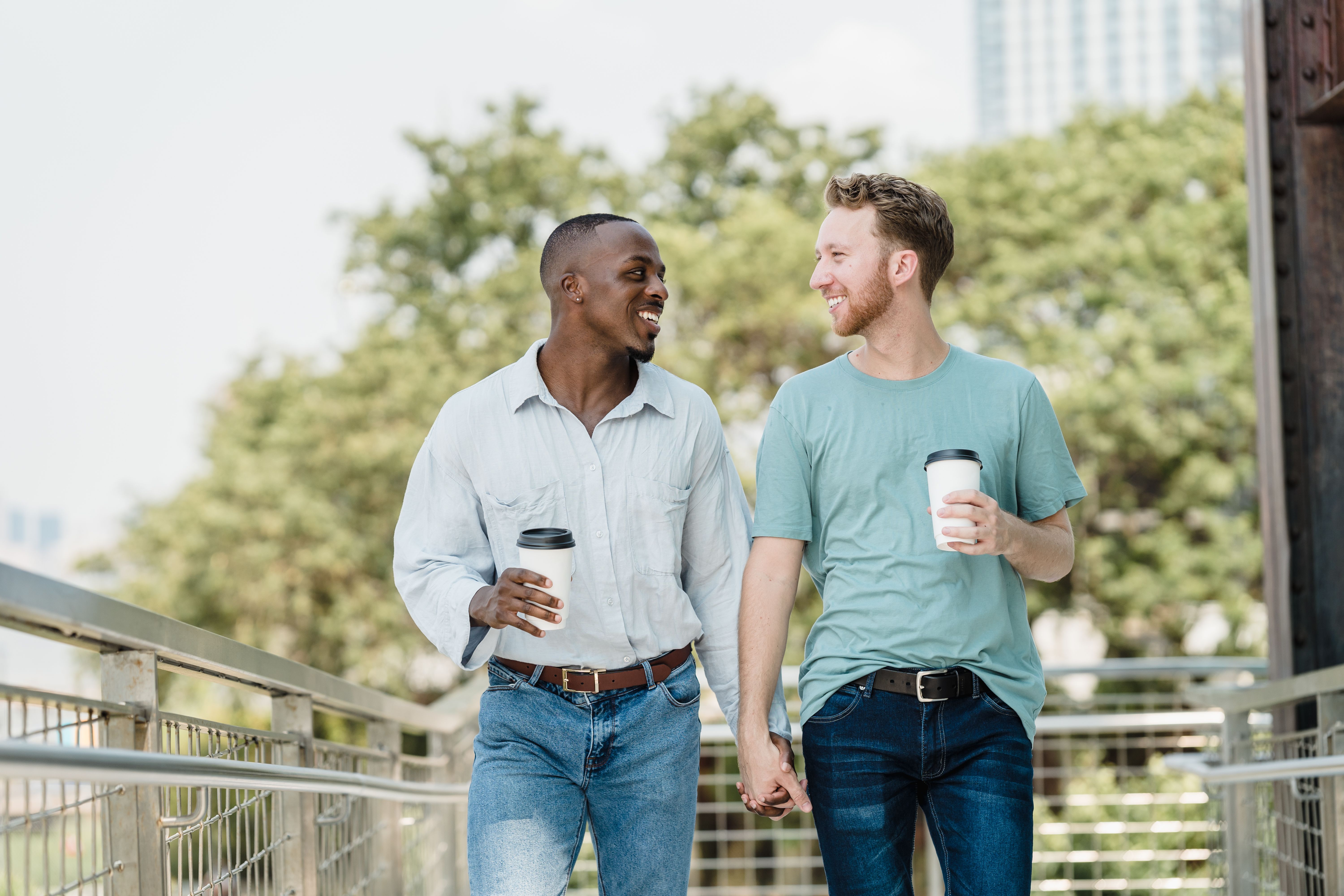 Men Walking with Cups · Free Stock Photo