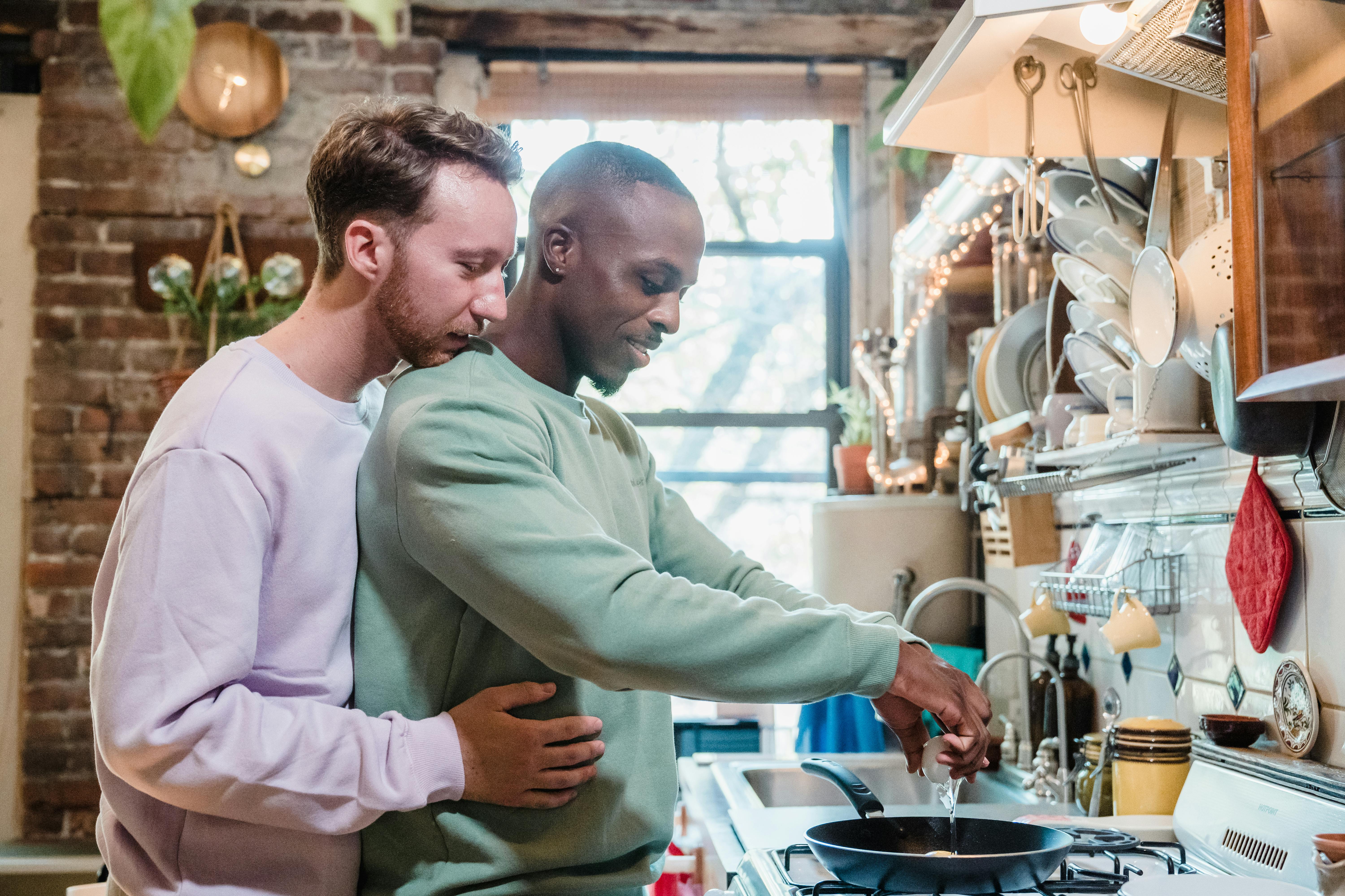 Happy Men Cooking Breakfast Together · Free Stock Photo