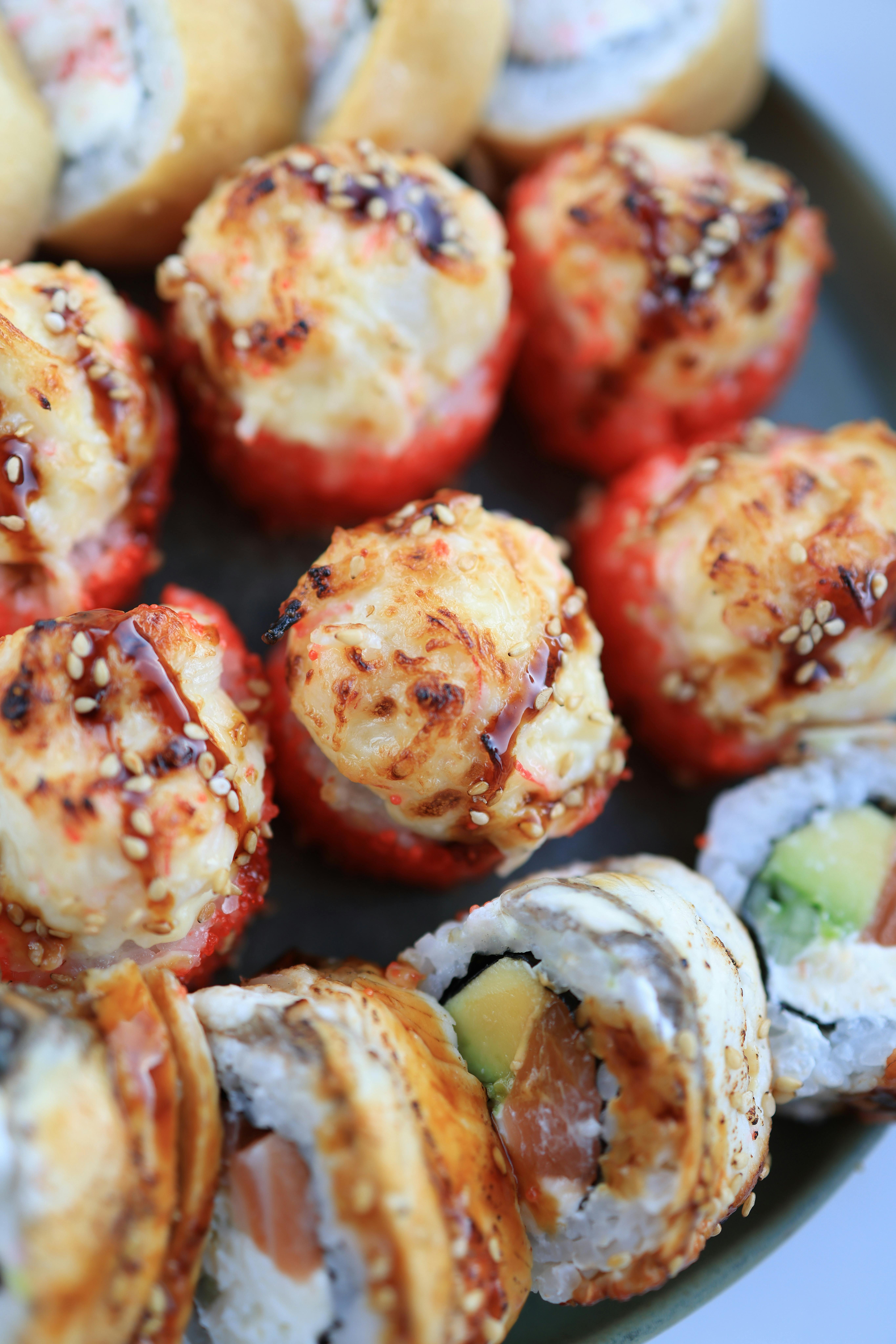 Sushi Rolls and Baked Goods · Free Stock Photo