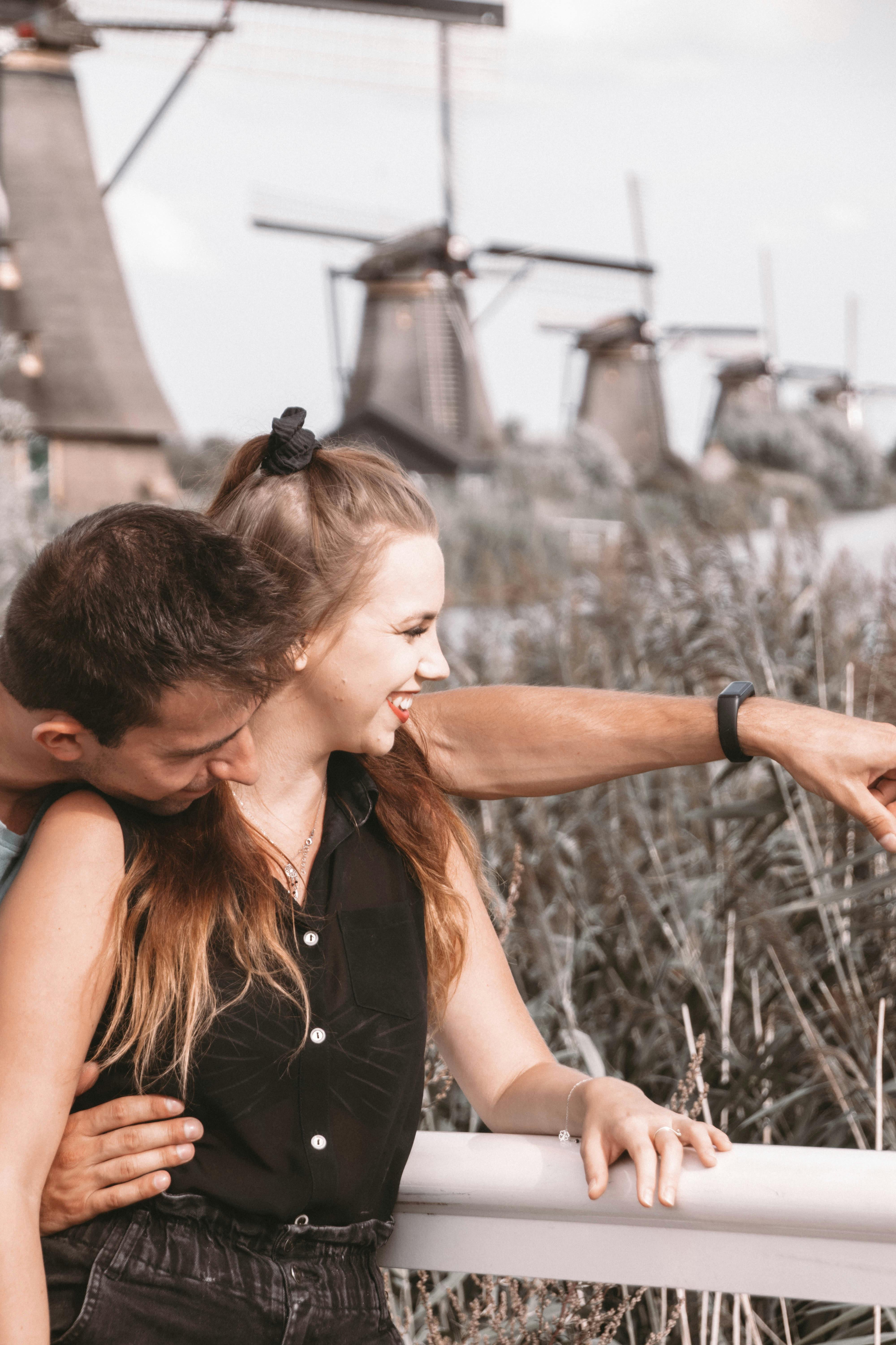 Romantic Couple Sitting Wooden Bench · Free Stock Photo