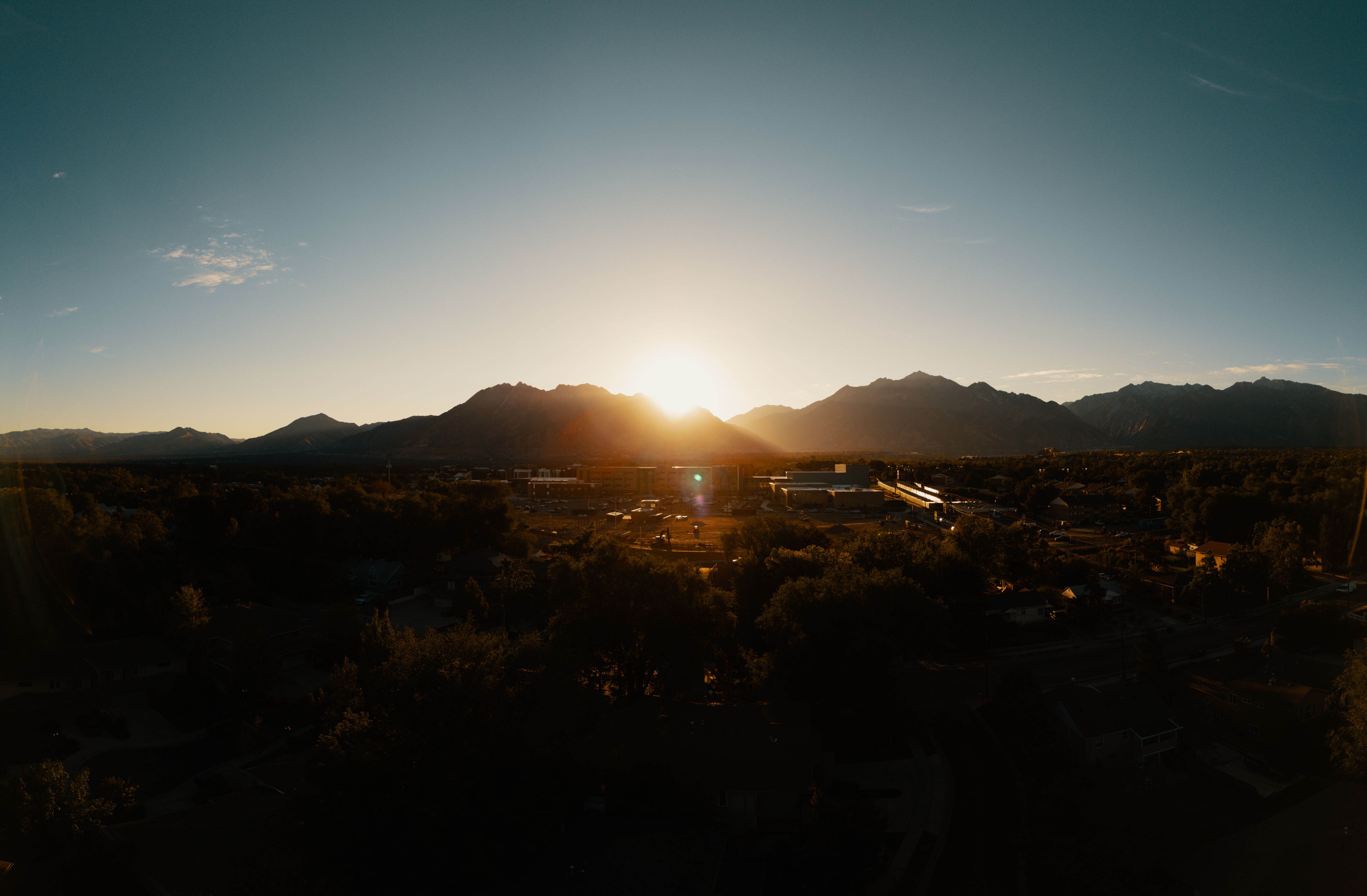 Sun Setting Behind Mountains · Free Stock Photo
