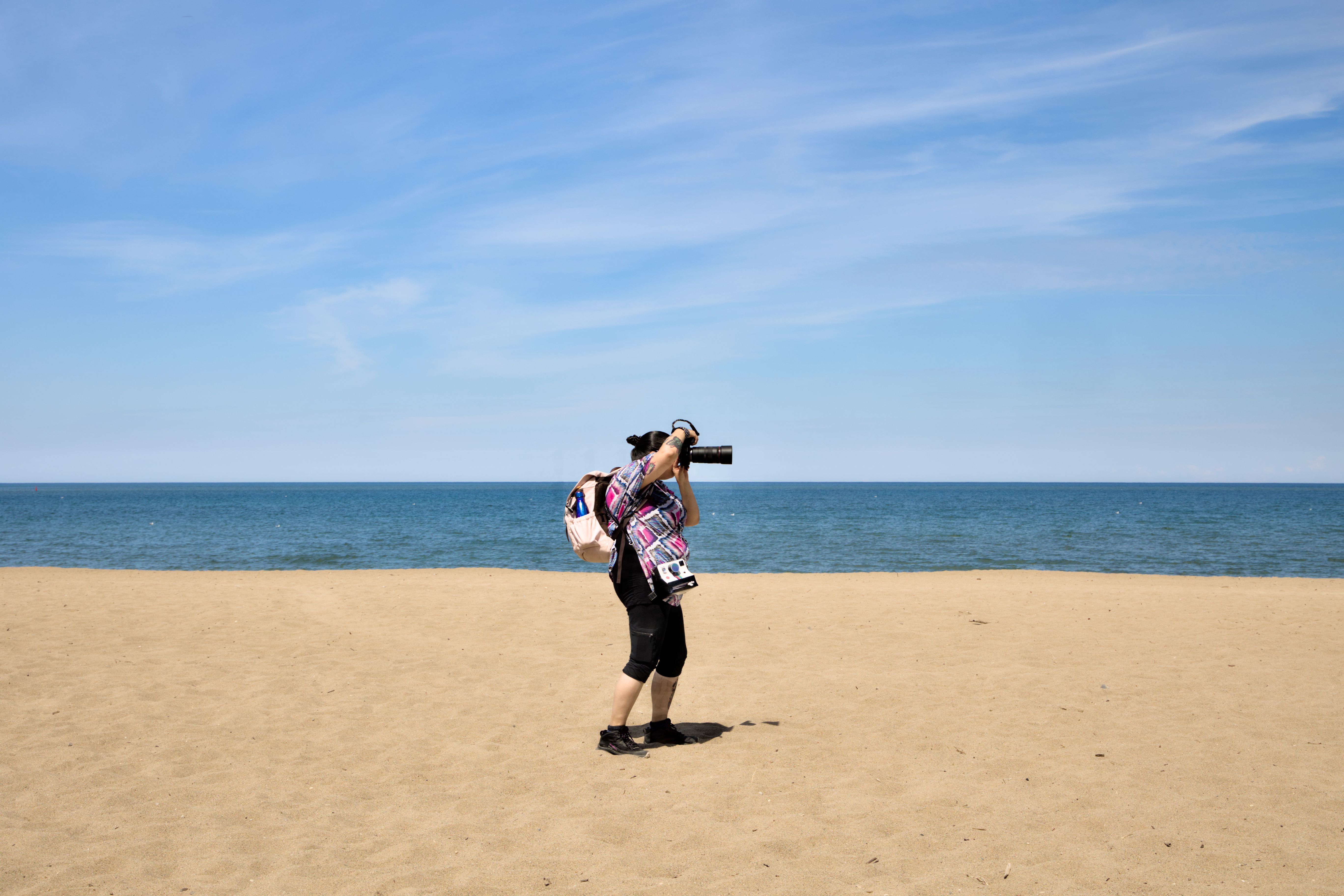 A Photographer at the Beach · Free Stock Photo