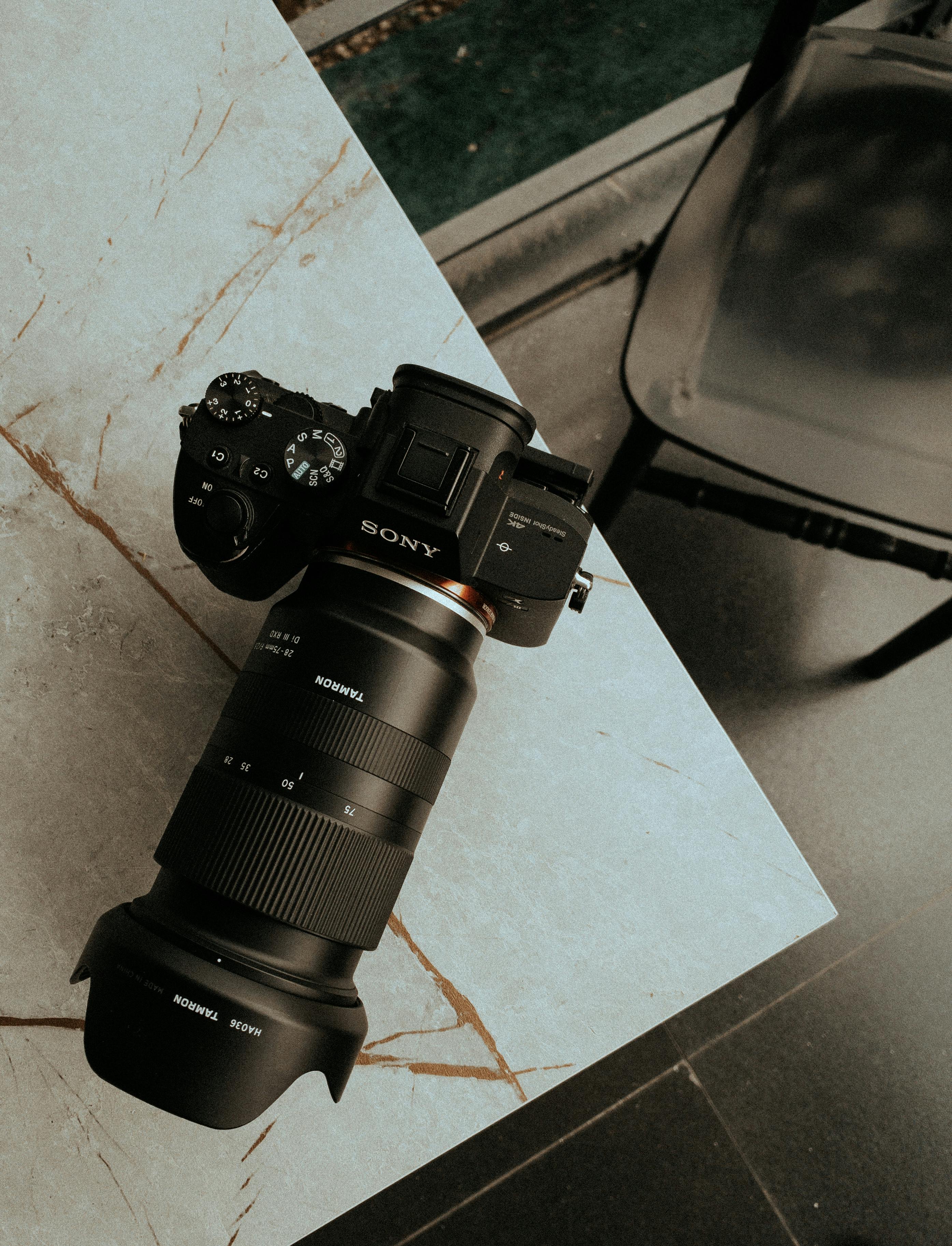 Top View of a Camera on a Desk · Free Stock Photo