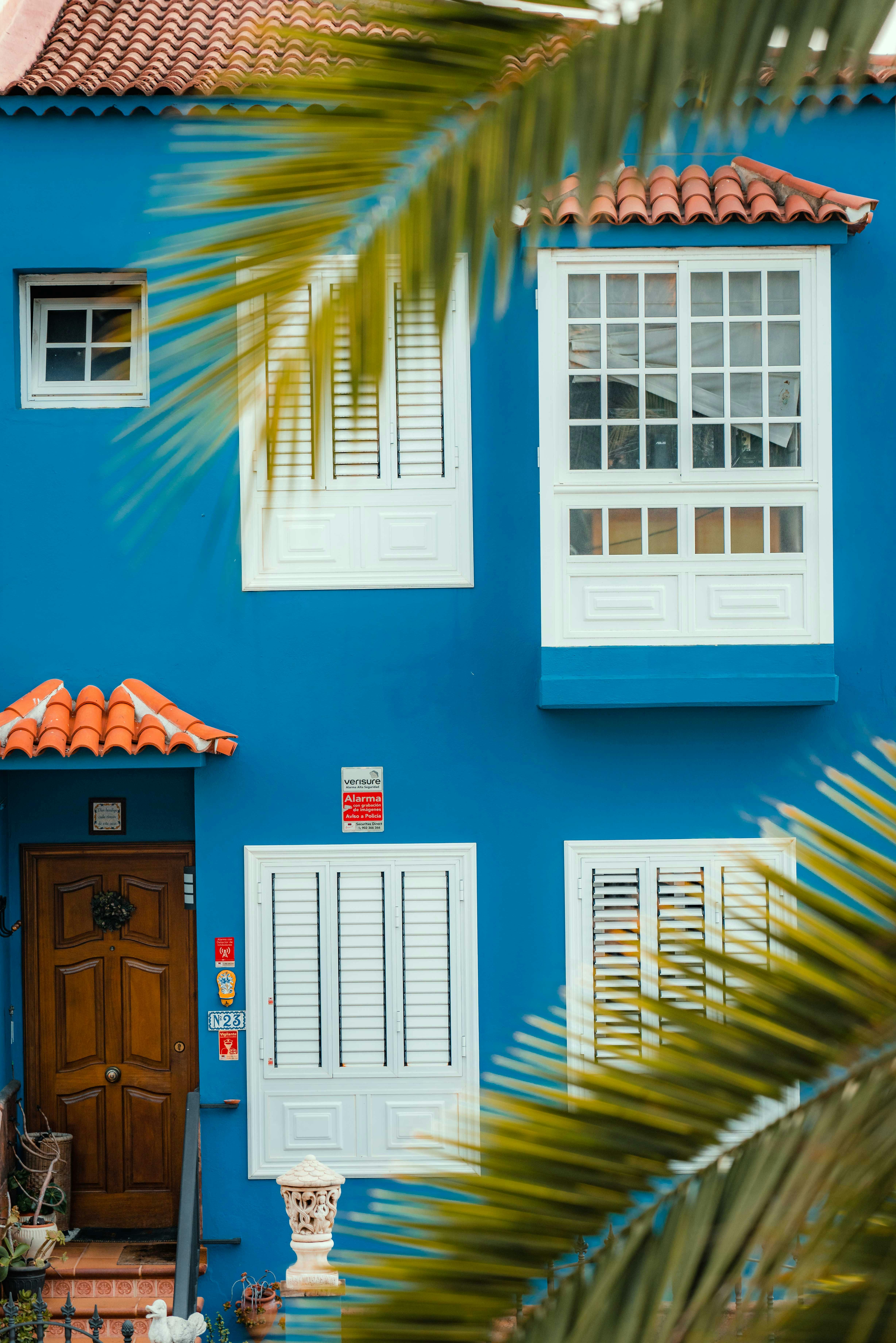 Blue House with White Door and Windows · Free Stock Photo