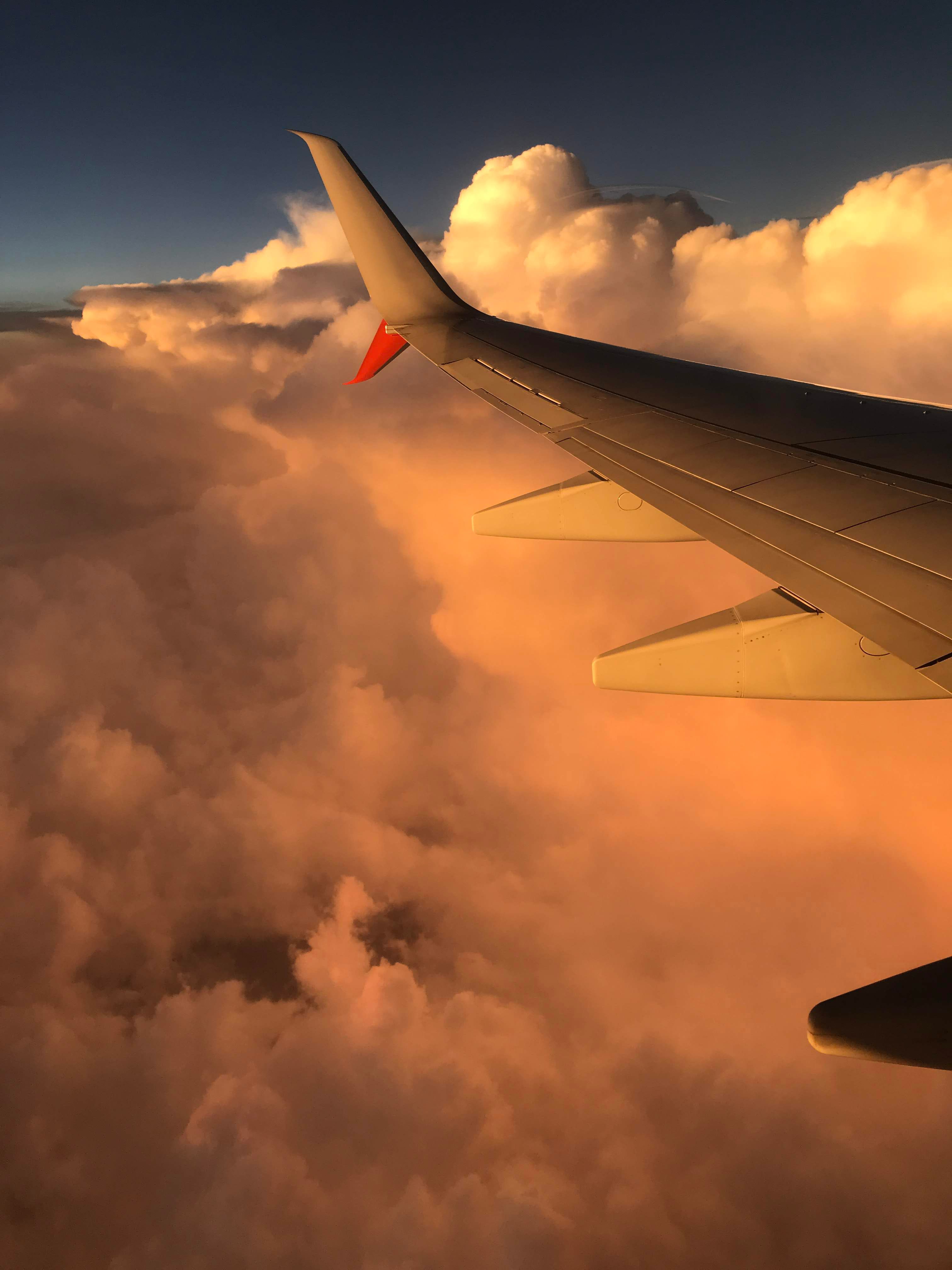Aerial Photography of White Airplane Wing Above White Clouds · Free ...