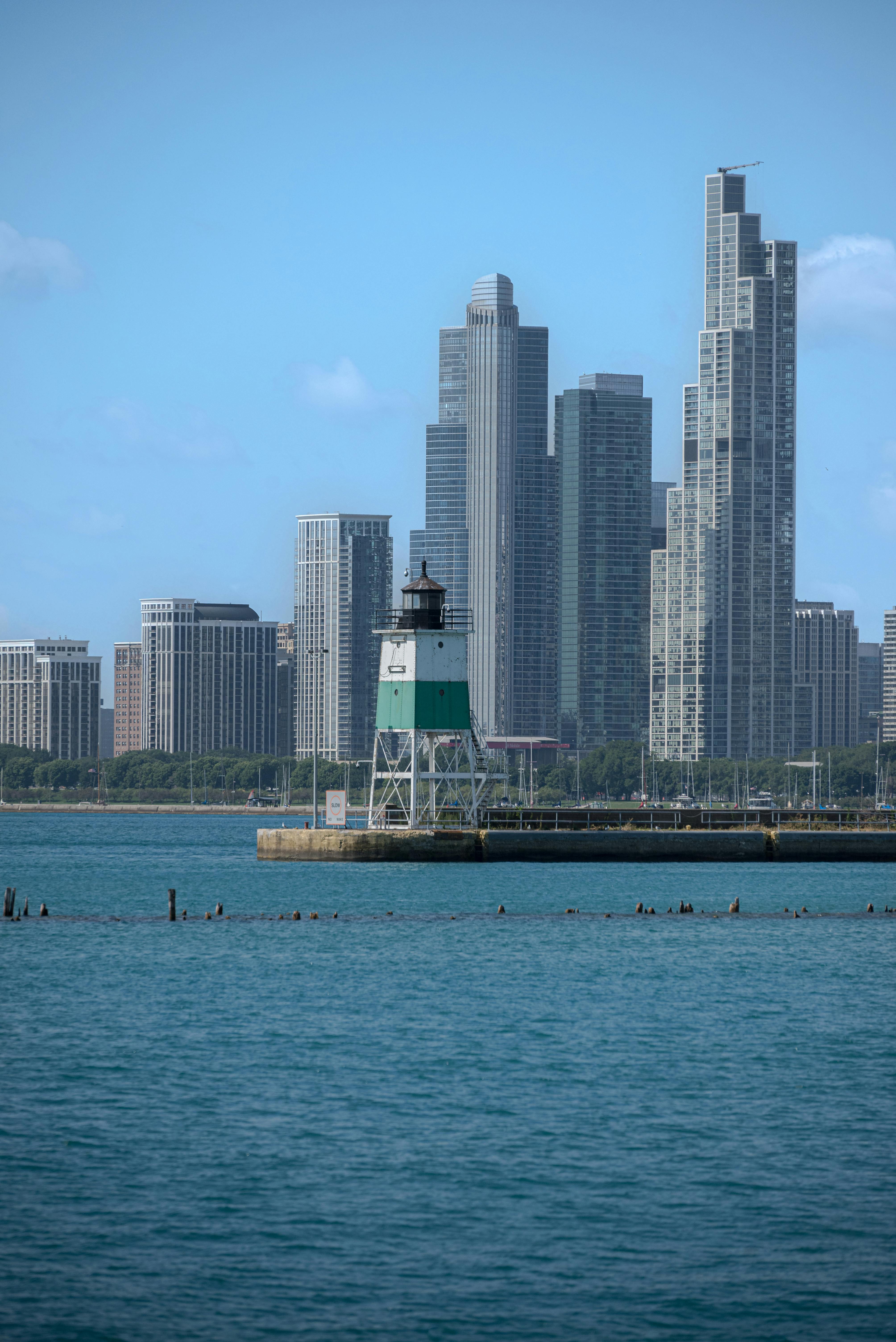 Aerial View of City Buildings Near Body of Water · Free Stock Photo