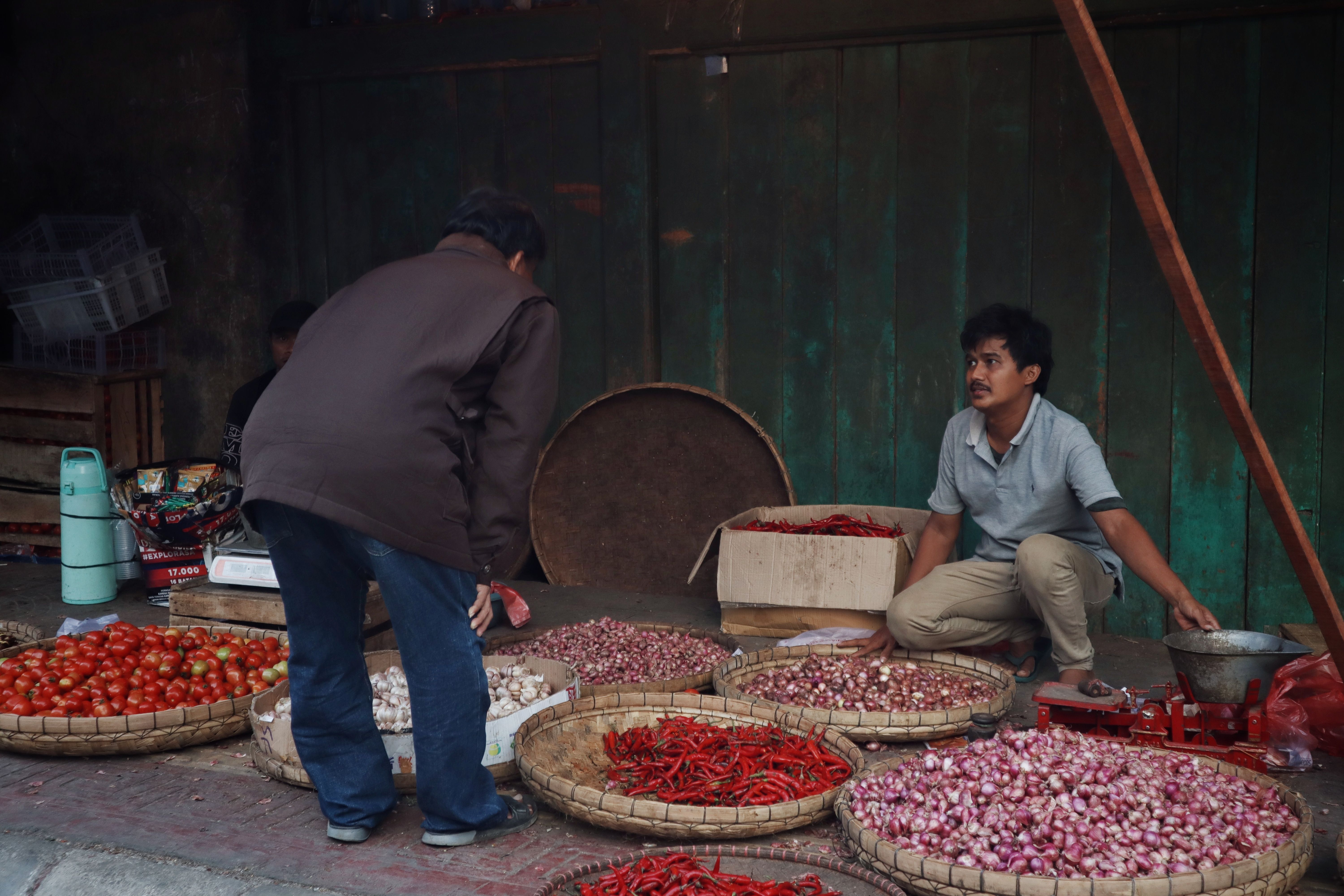 A Man Selling Vegetables at the Street · Free Stock Photo