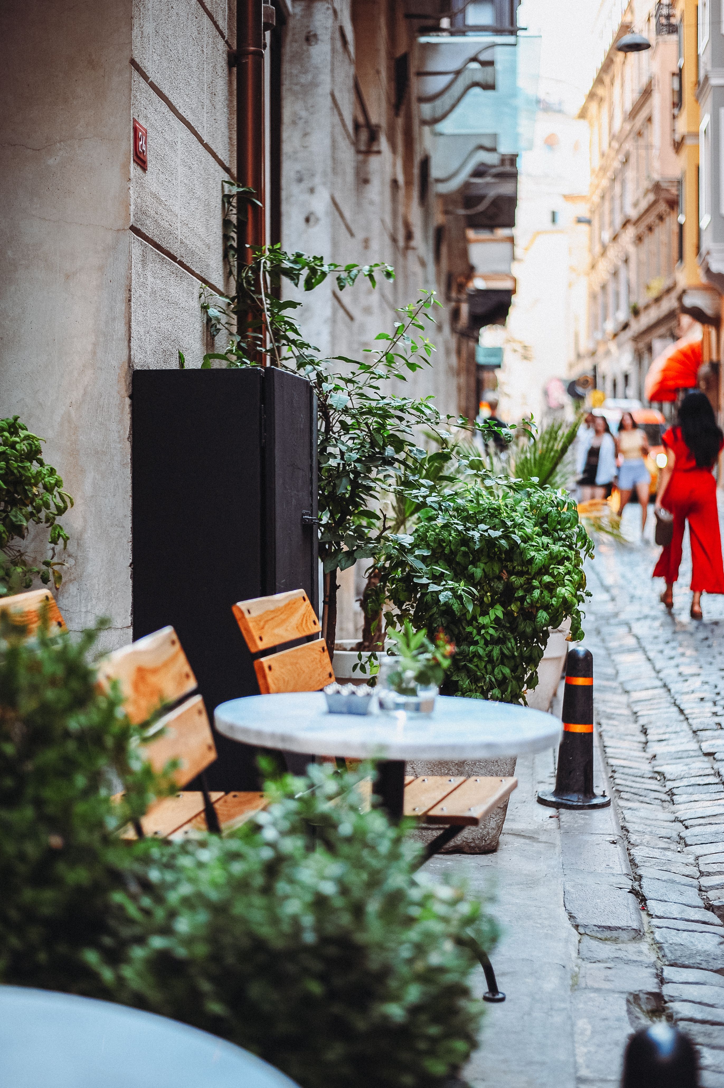 Table and Chairs on Street · Free Stock Photo