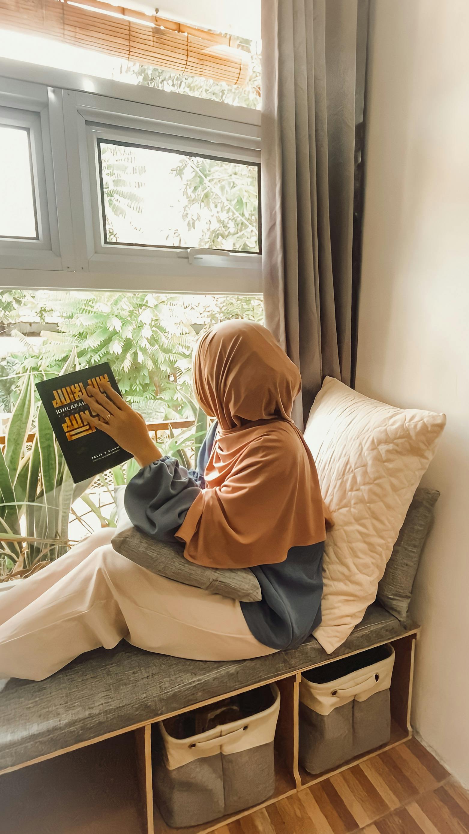 Woman Reading a Book Beside a Man · Free Stock Photo