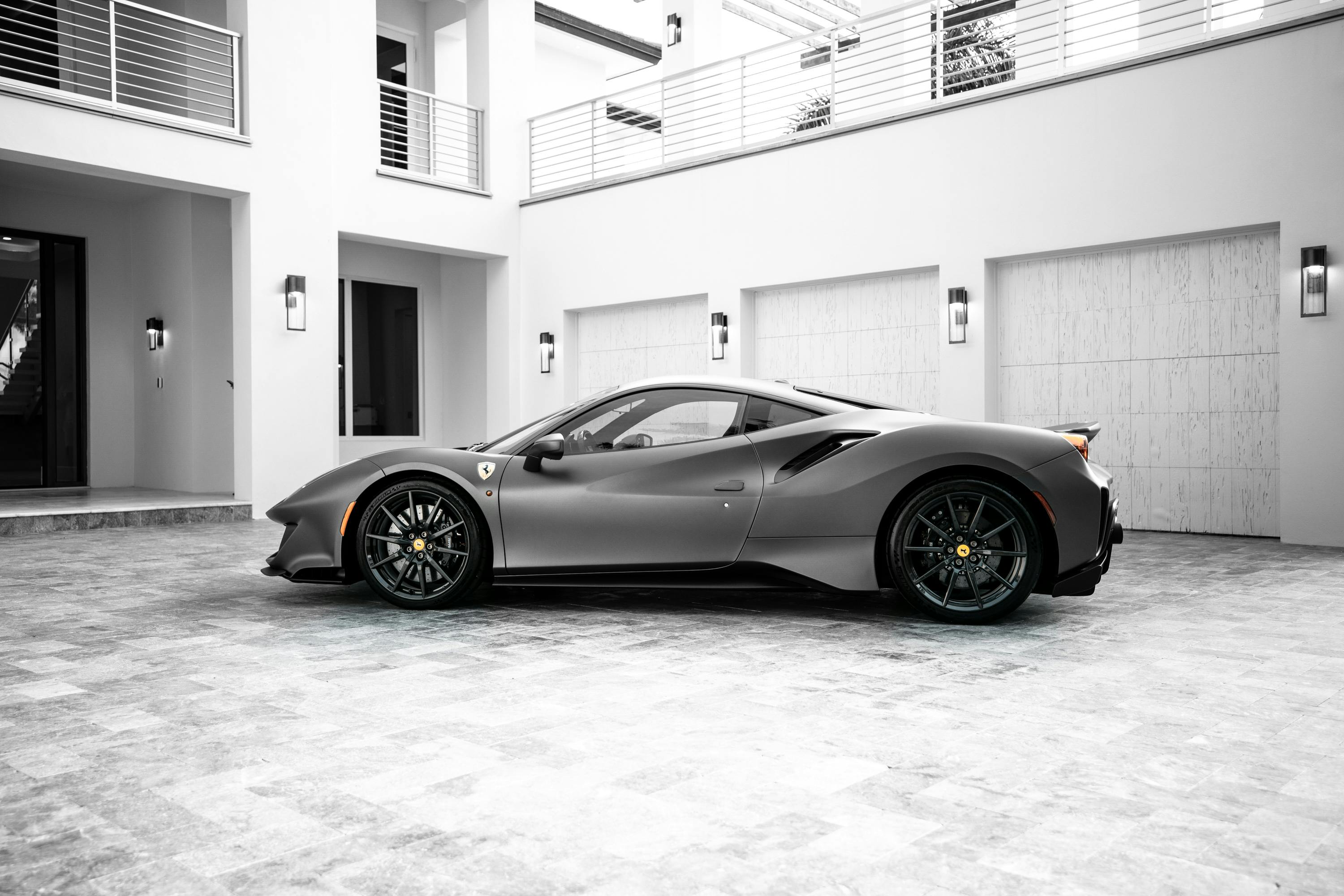 A Car Parked in Front of a Building · Free Stock Photo