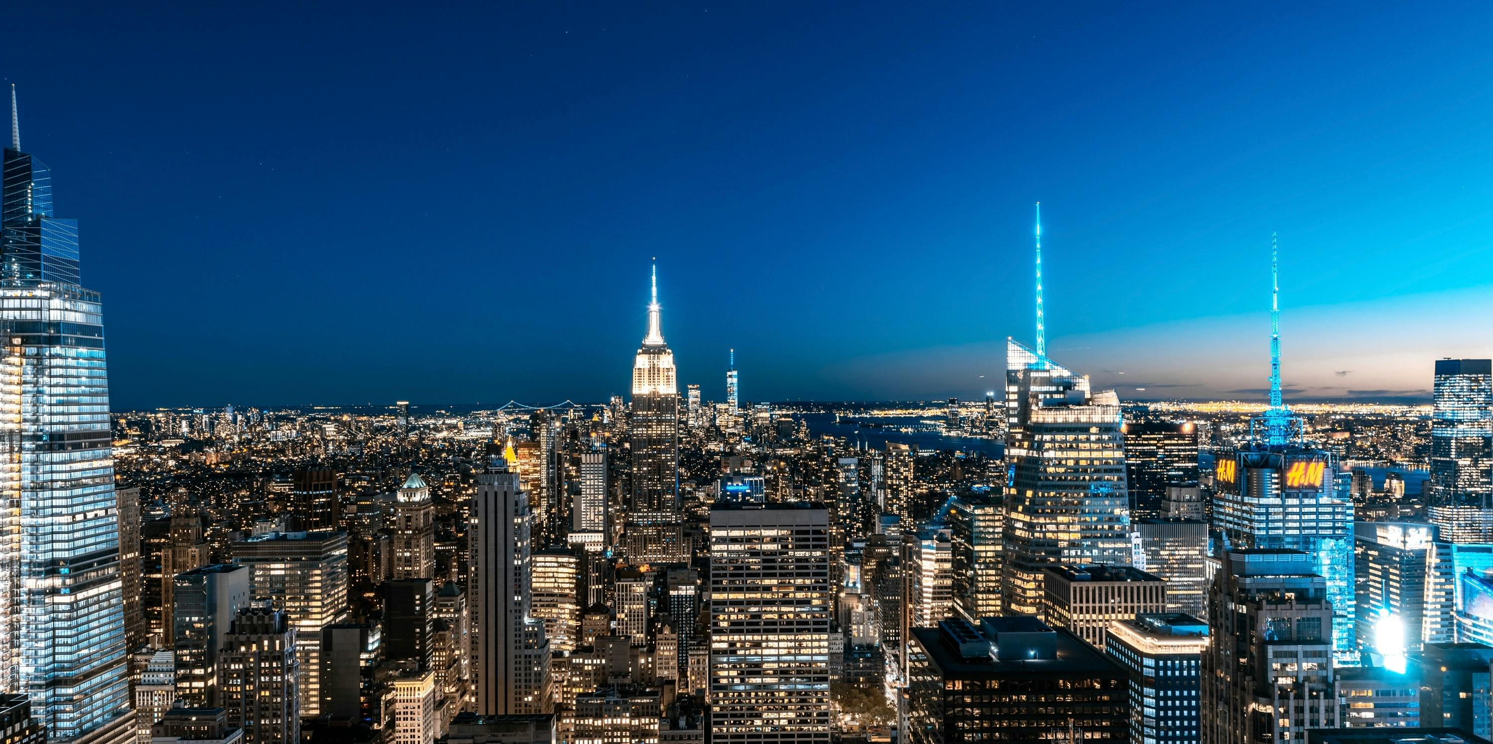 Illuminated Buildings on Skyline · Free Stock Photo
