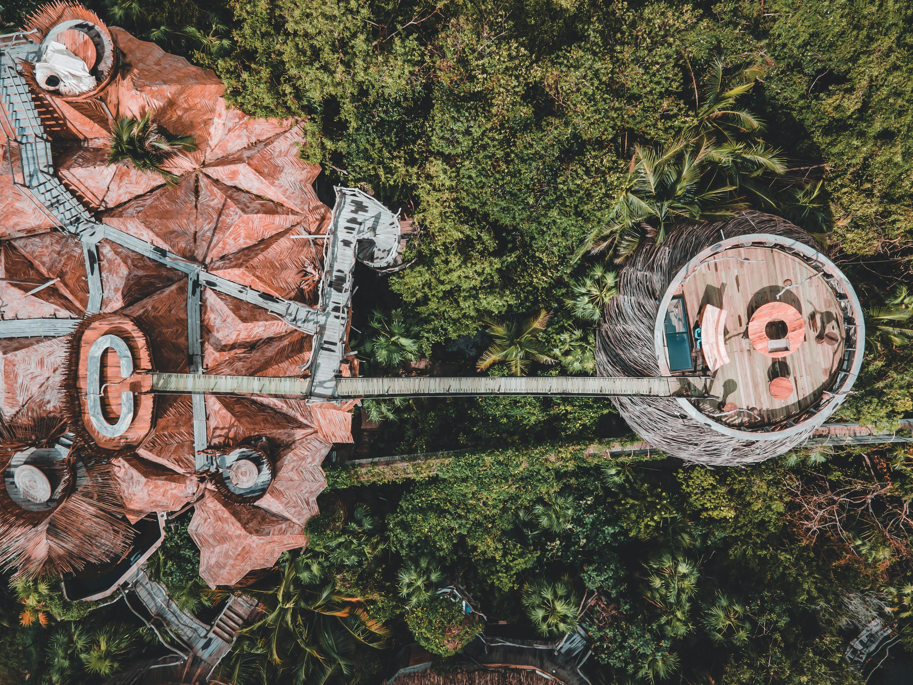 Aerial View of Nipa Hut Cottages and Bamboo Tree House · Free Stock Photo