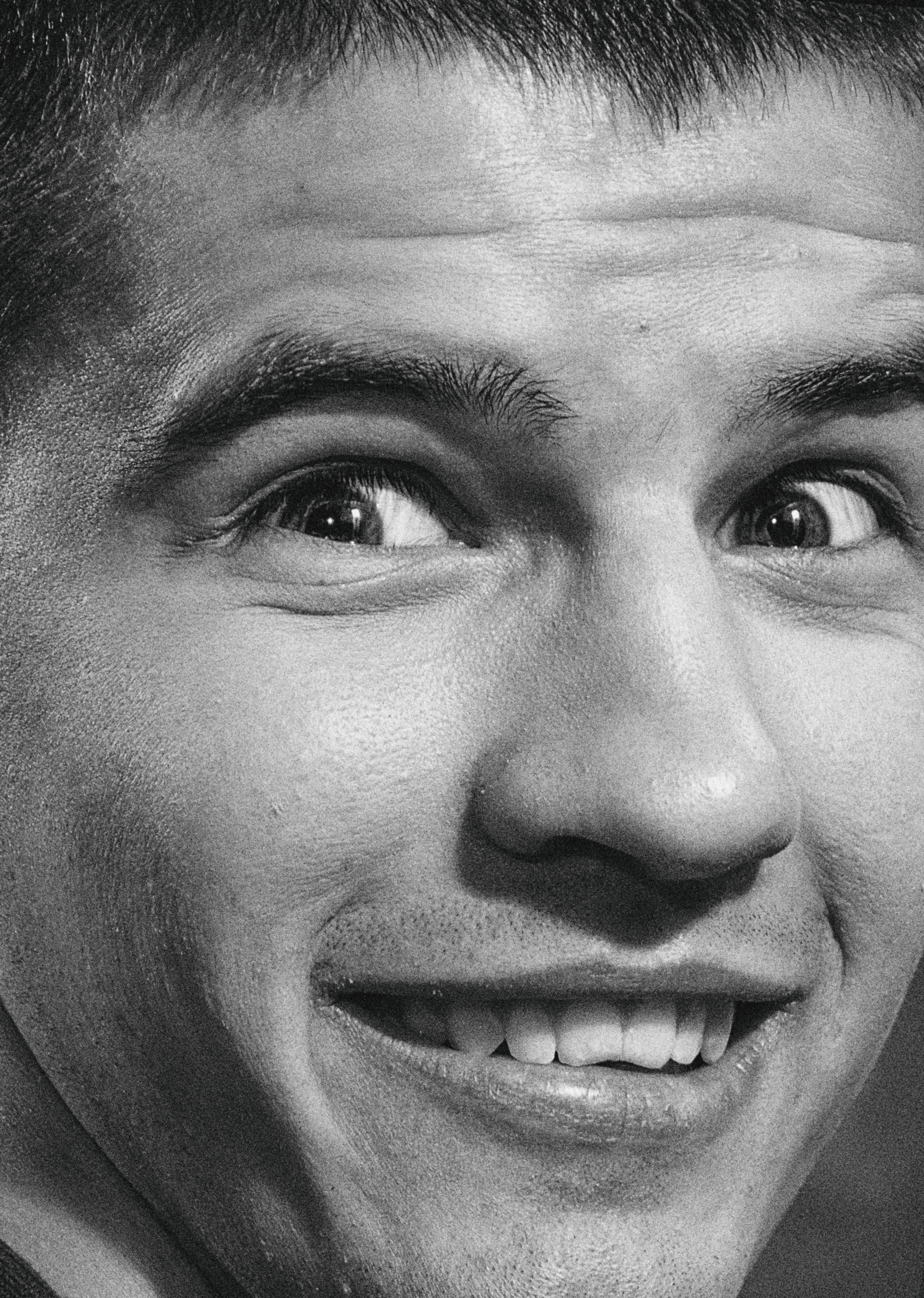 Grayscale Photo of a Man Smiling · Free Stock Photo