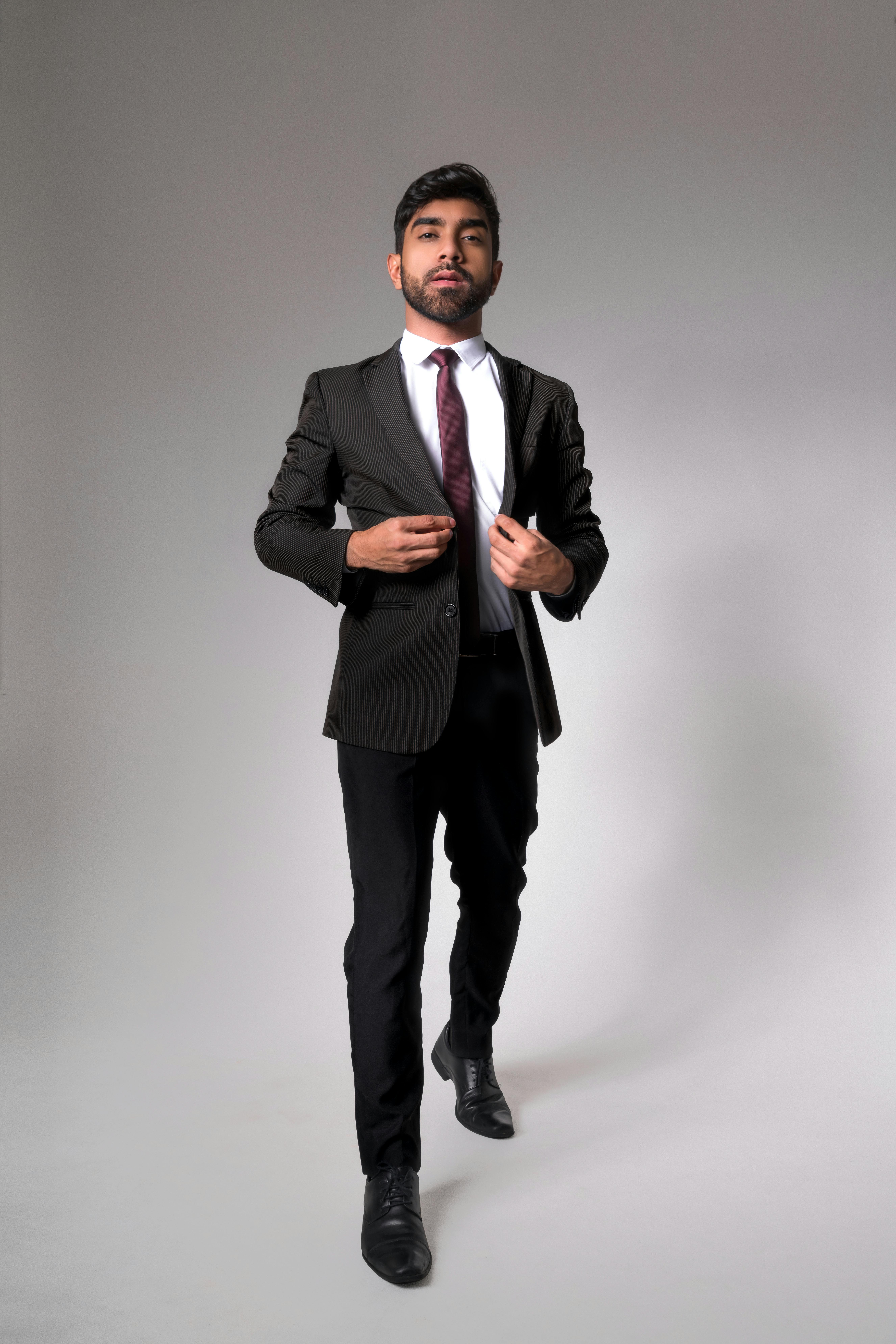 Man in Black Suit Standing · Free Stock Photo