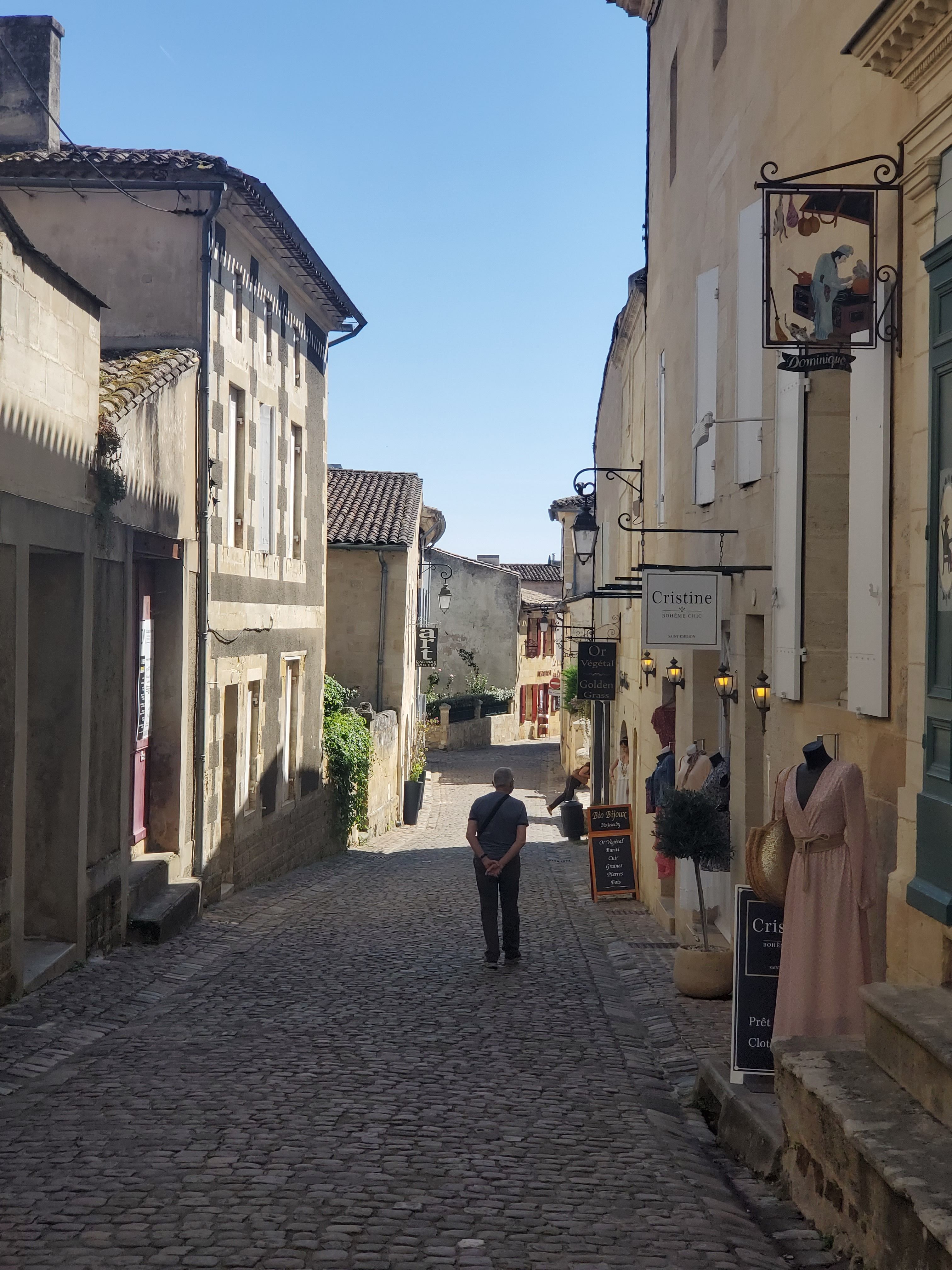 An Empty Street Between Houses · Free Stock Photo