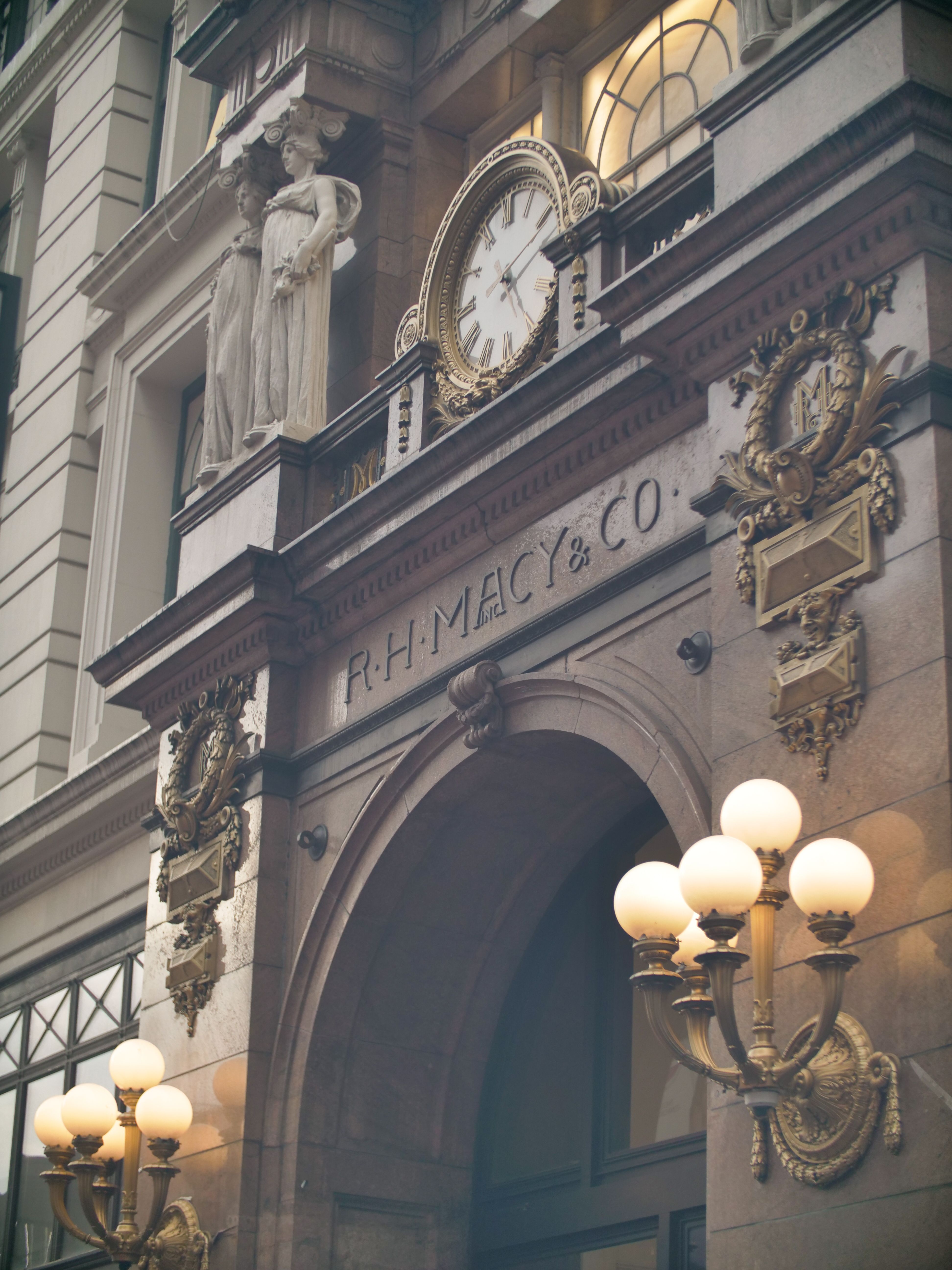 Photo of a Neoclassical Gate with Figurines · Free Stock Photo