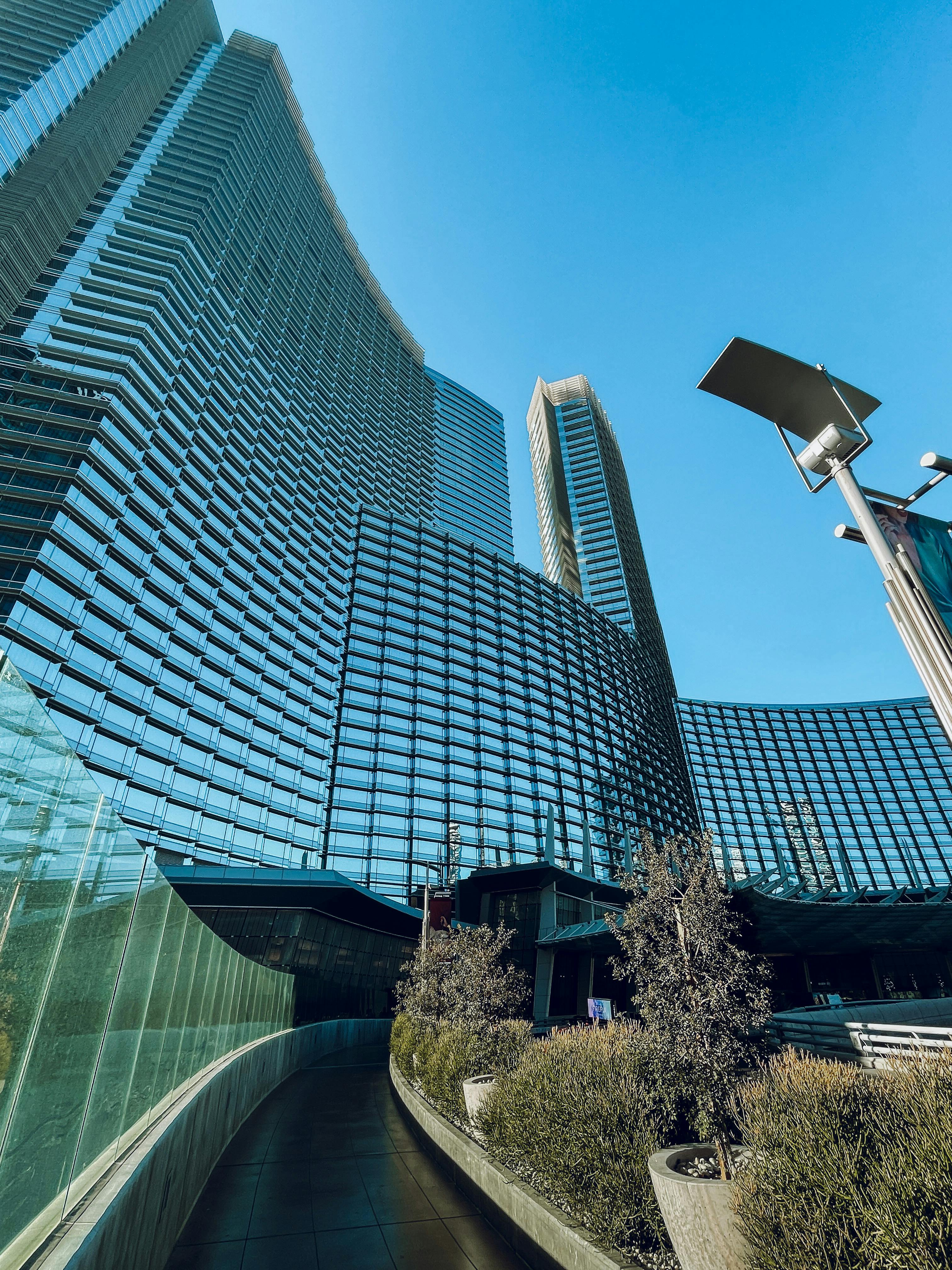 Walkway Beside a High Rise Building · Free Stock Photo