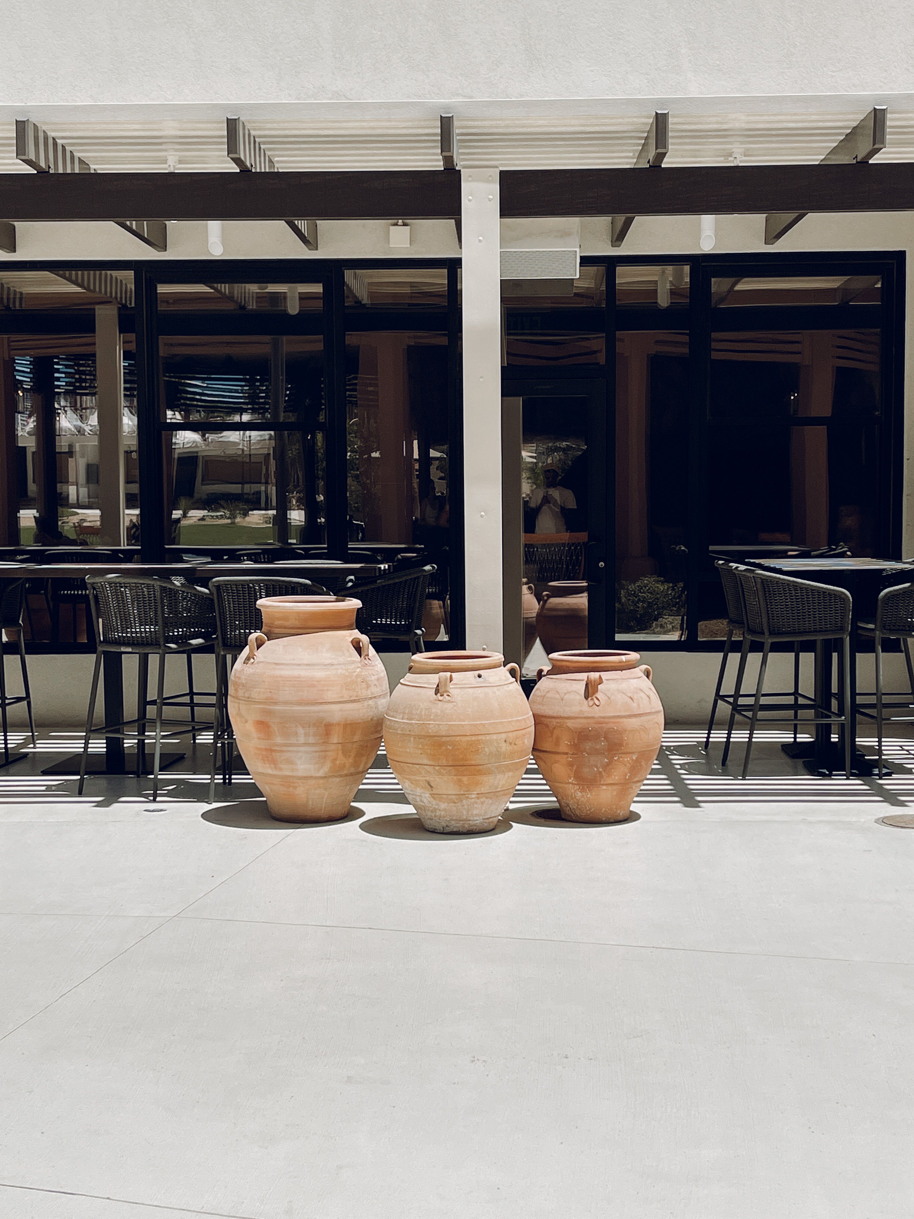 Pottery Urns outside a Modern Building · Free Stock Photo