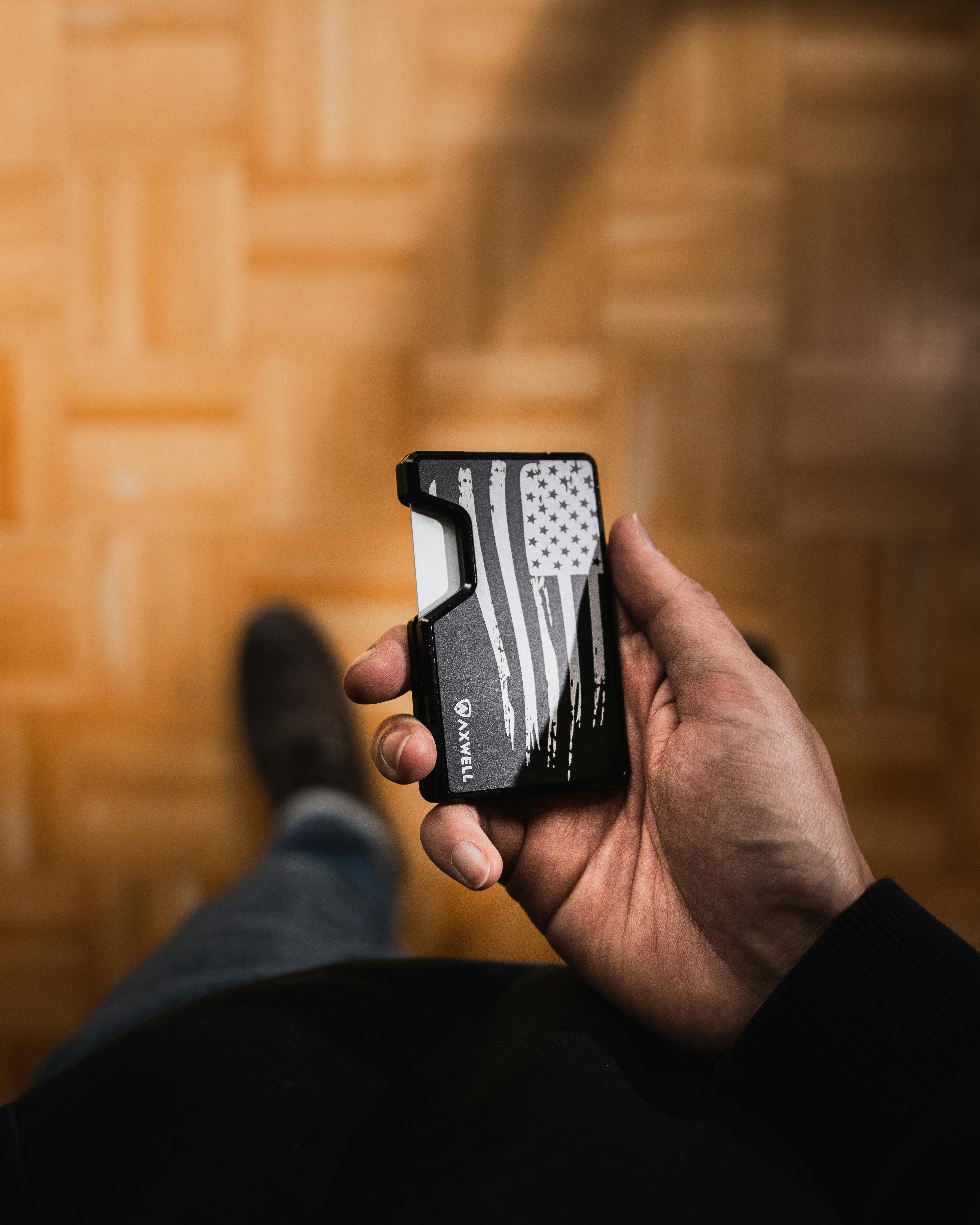 A Person Holding a Wallet · Free Stock Photo