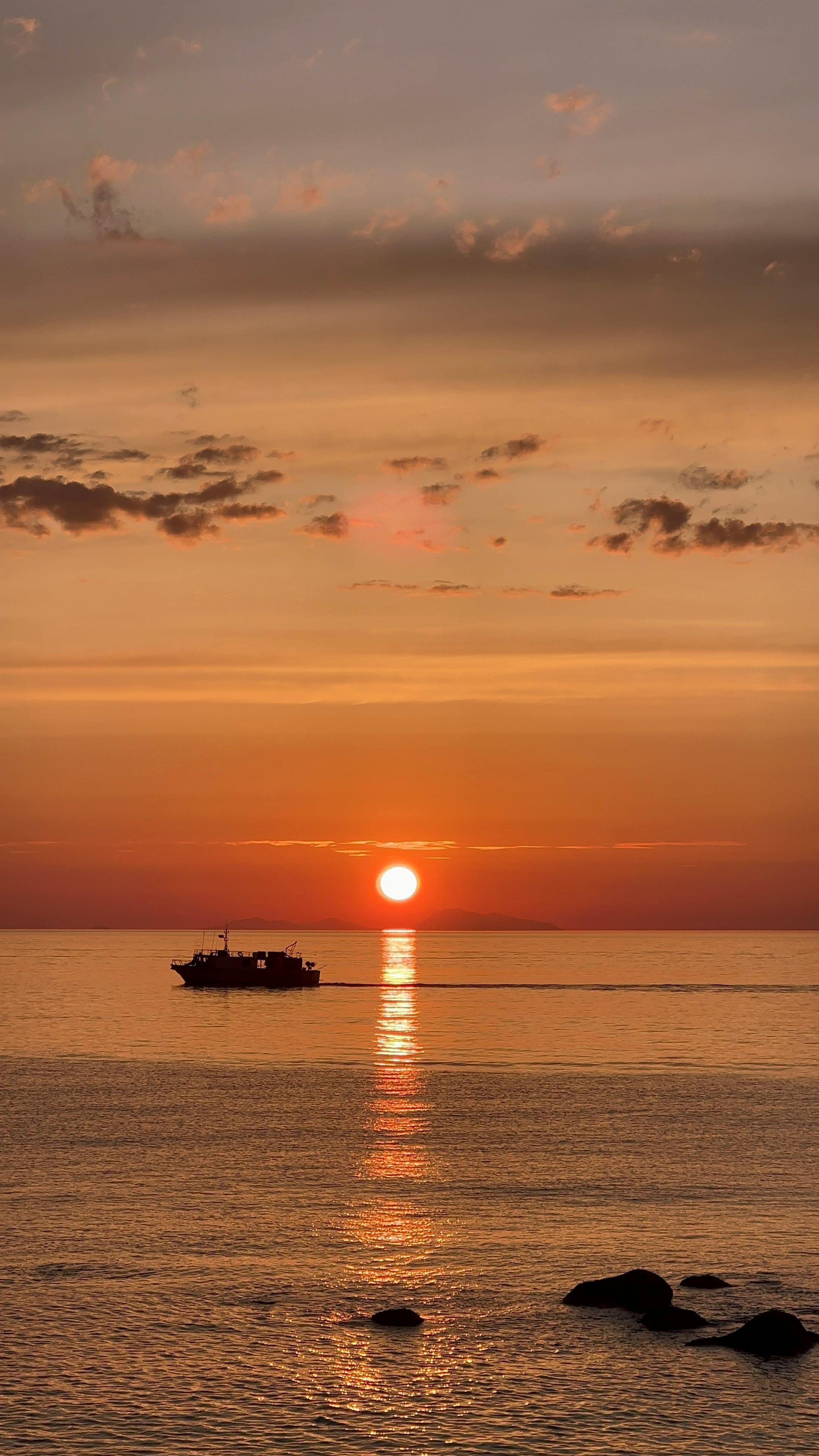 Calm Body Of Water During Golden Hour · Free Stock Photo