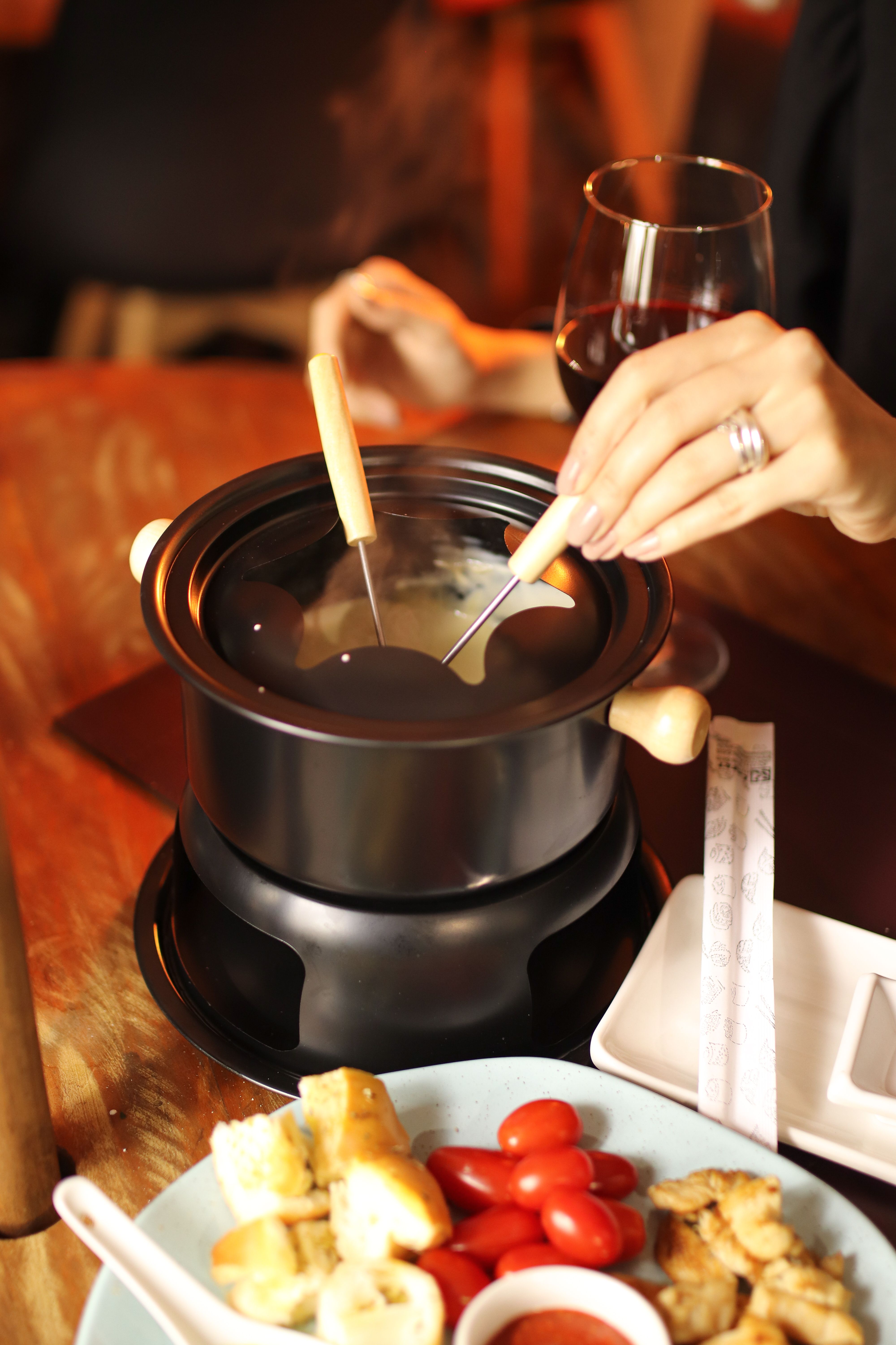 Person Stirring Pot With Wooden Stick · Free Stock Photo