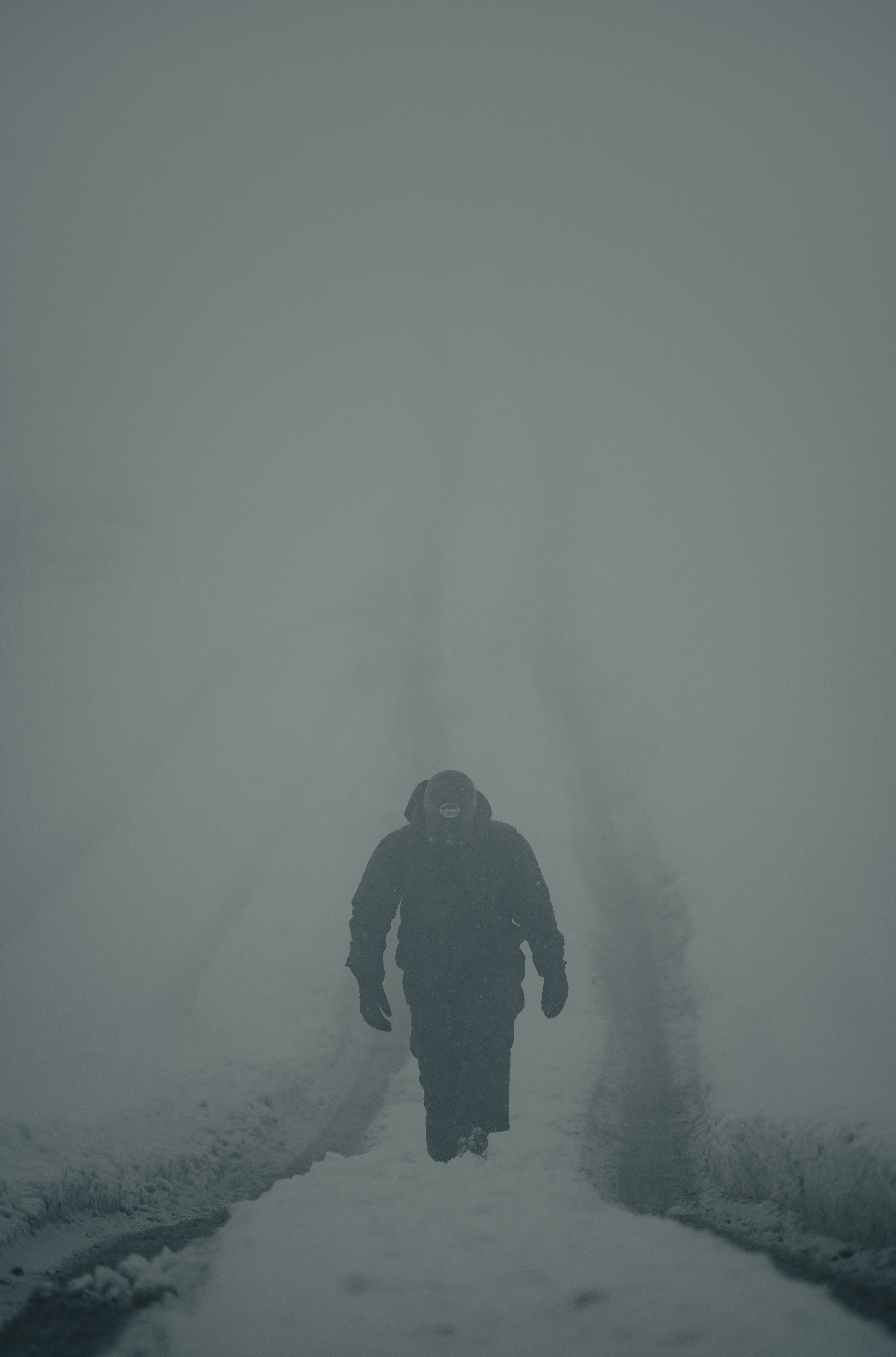 Person Walking in Snow and Fog · Free Stock Photo