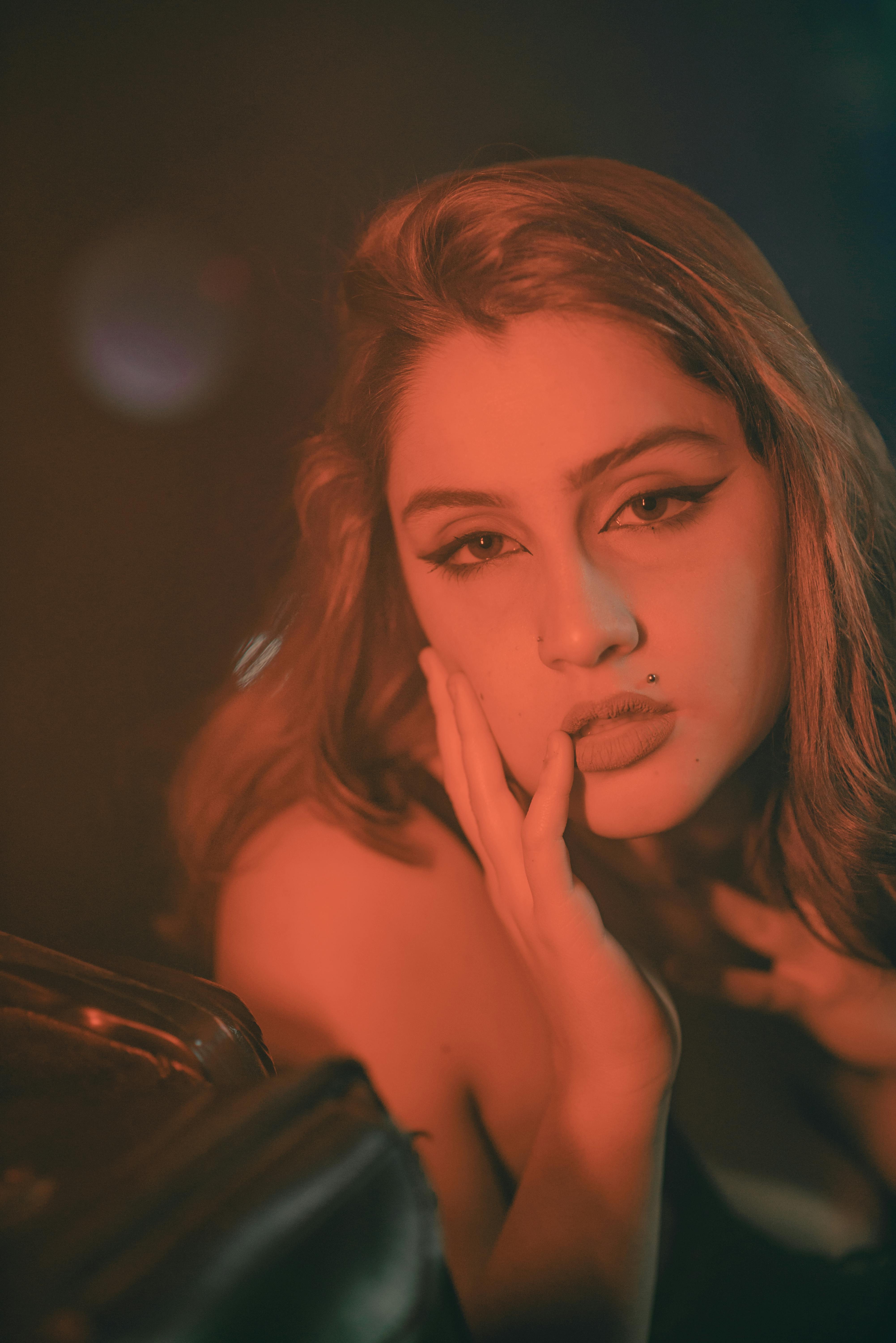 Woman with hand on Face · Free Stock Photo