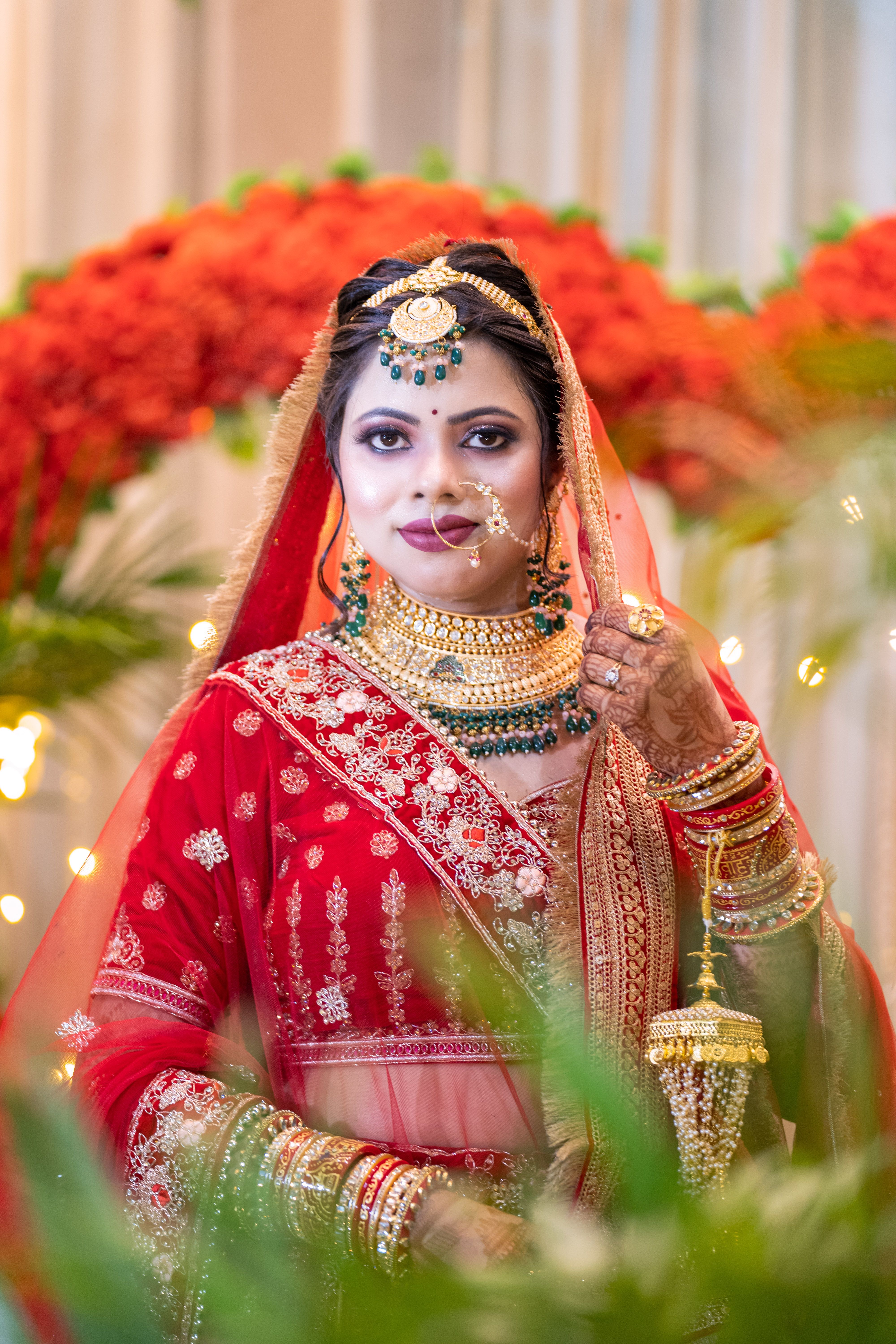 A Woman Modeling in Traditional Indian Bridal Clothing · Free Stock Photo