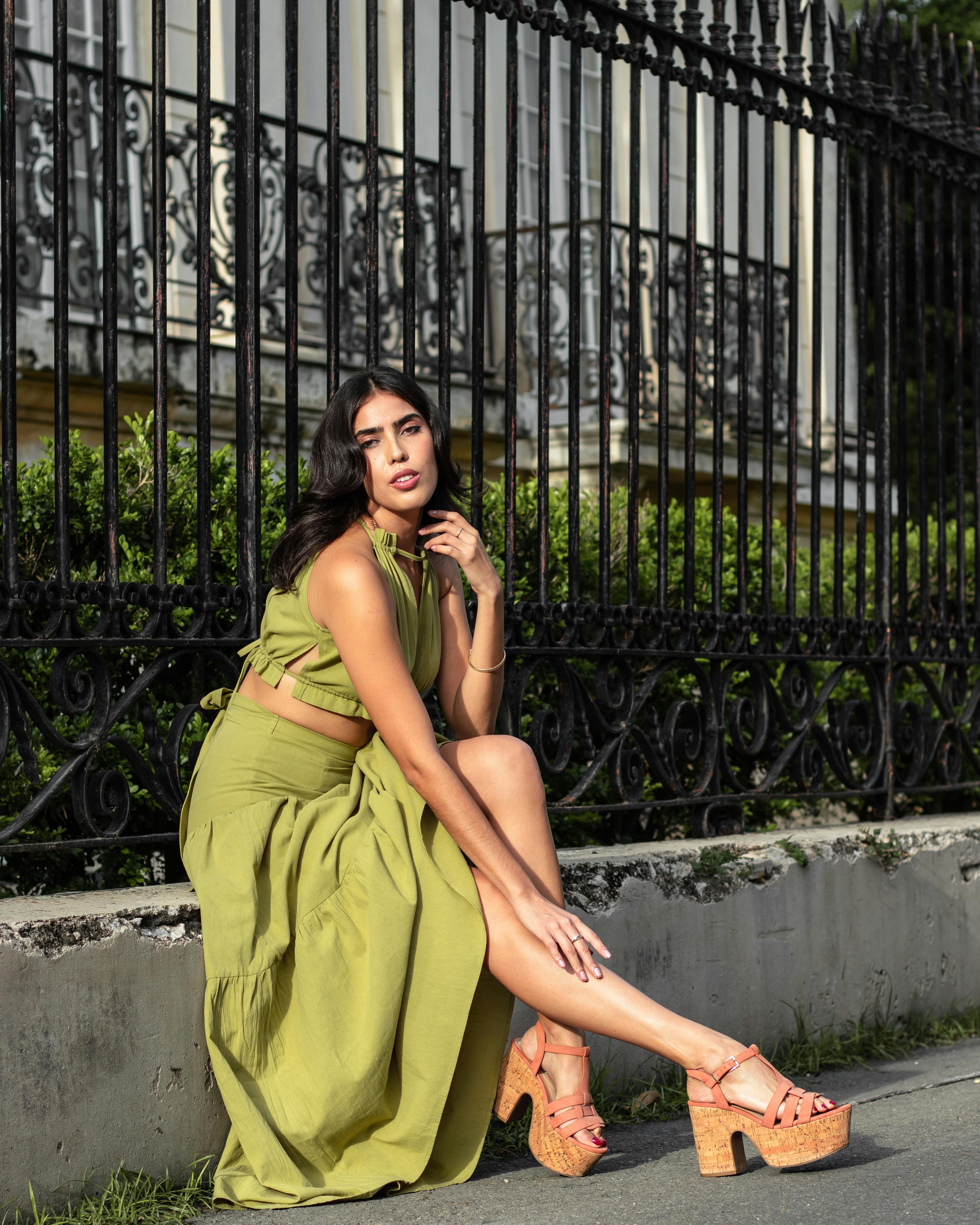 Female Fashion Model Posing in a Red Leather Dress · Free Stock Photo