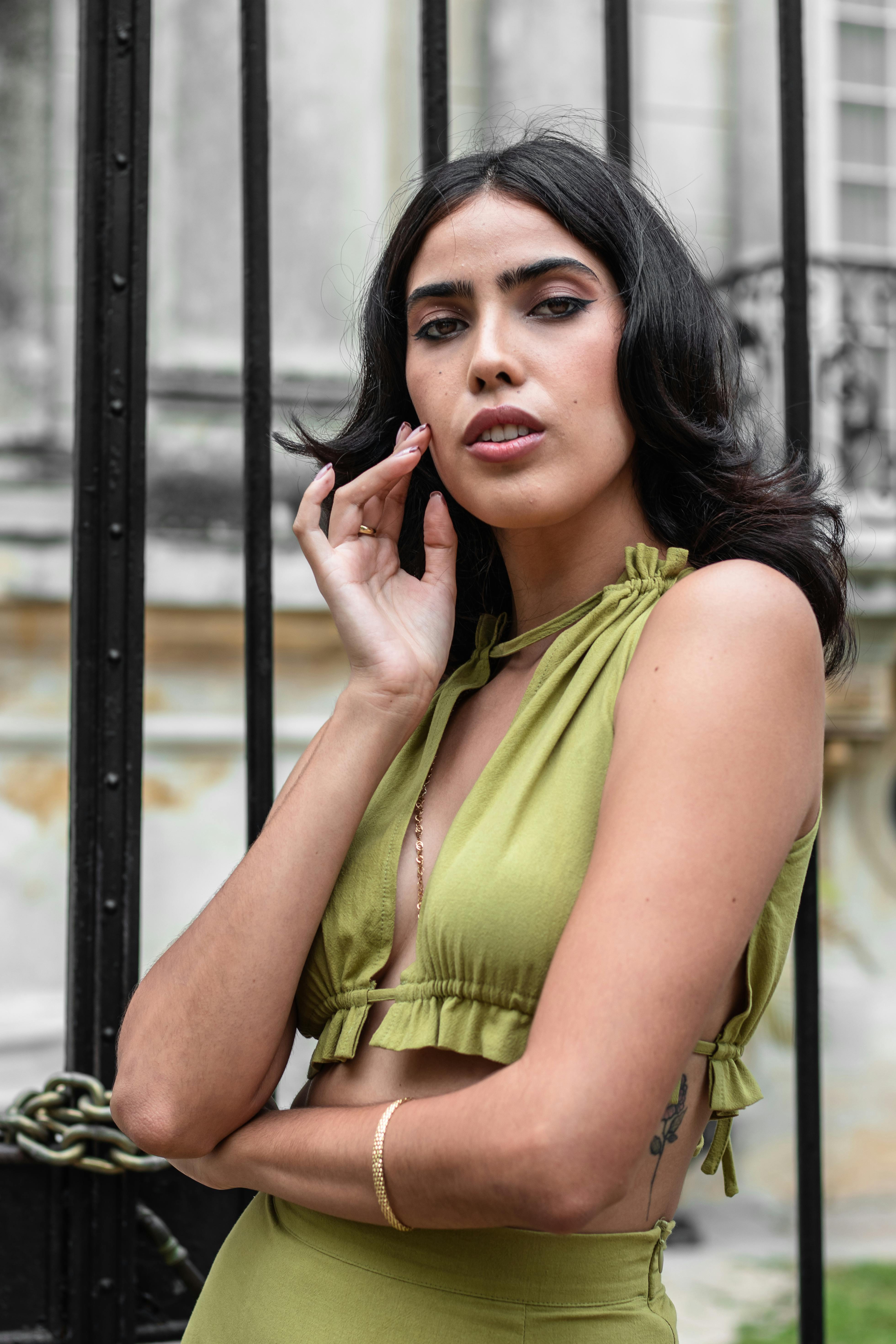 Female Fashion Model Posing in a Red Leather Dress · Free Stock Photo