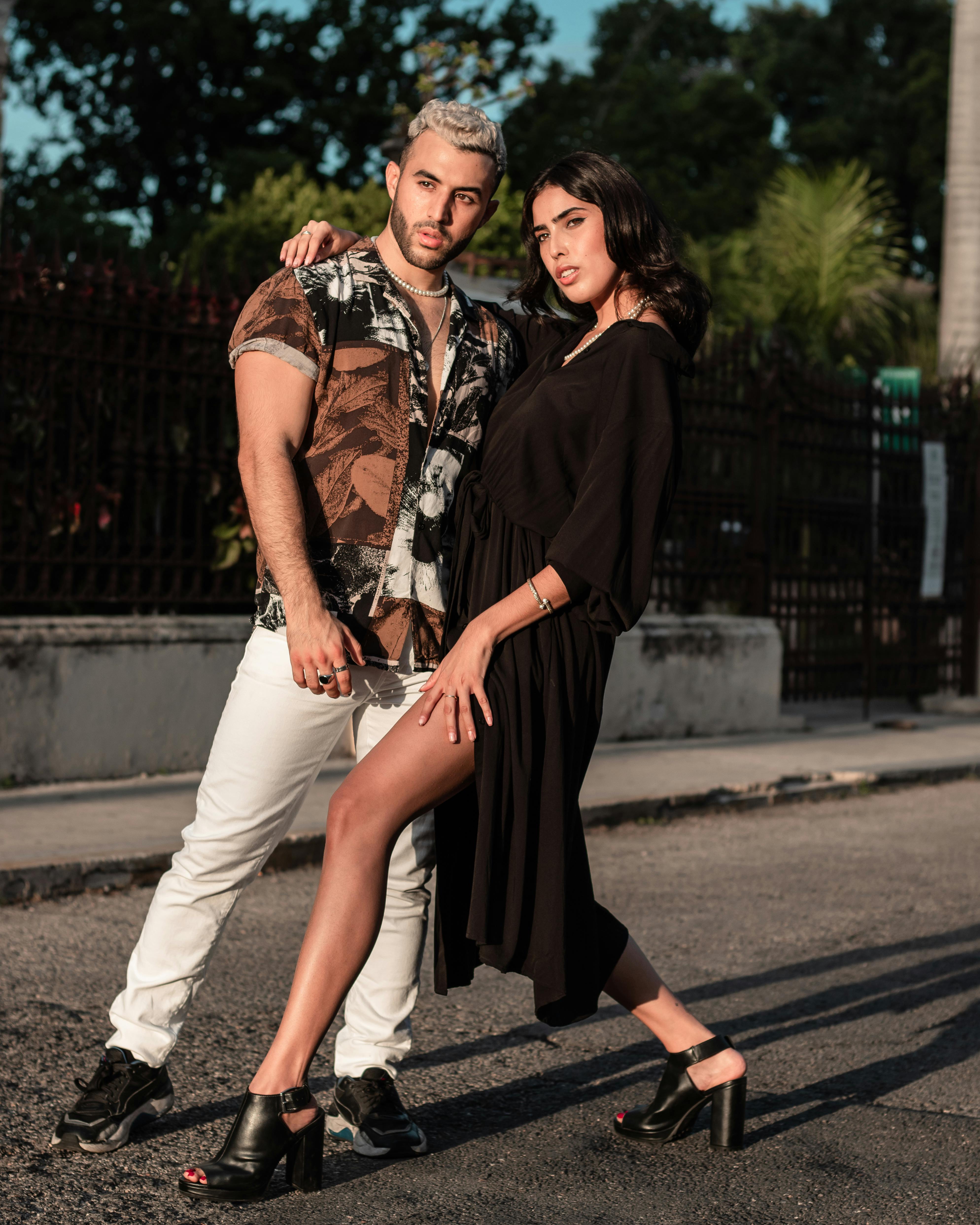 Woman in Black Dress Seriously Posing at the Camera · Free Stock Photo