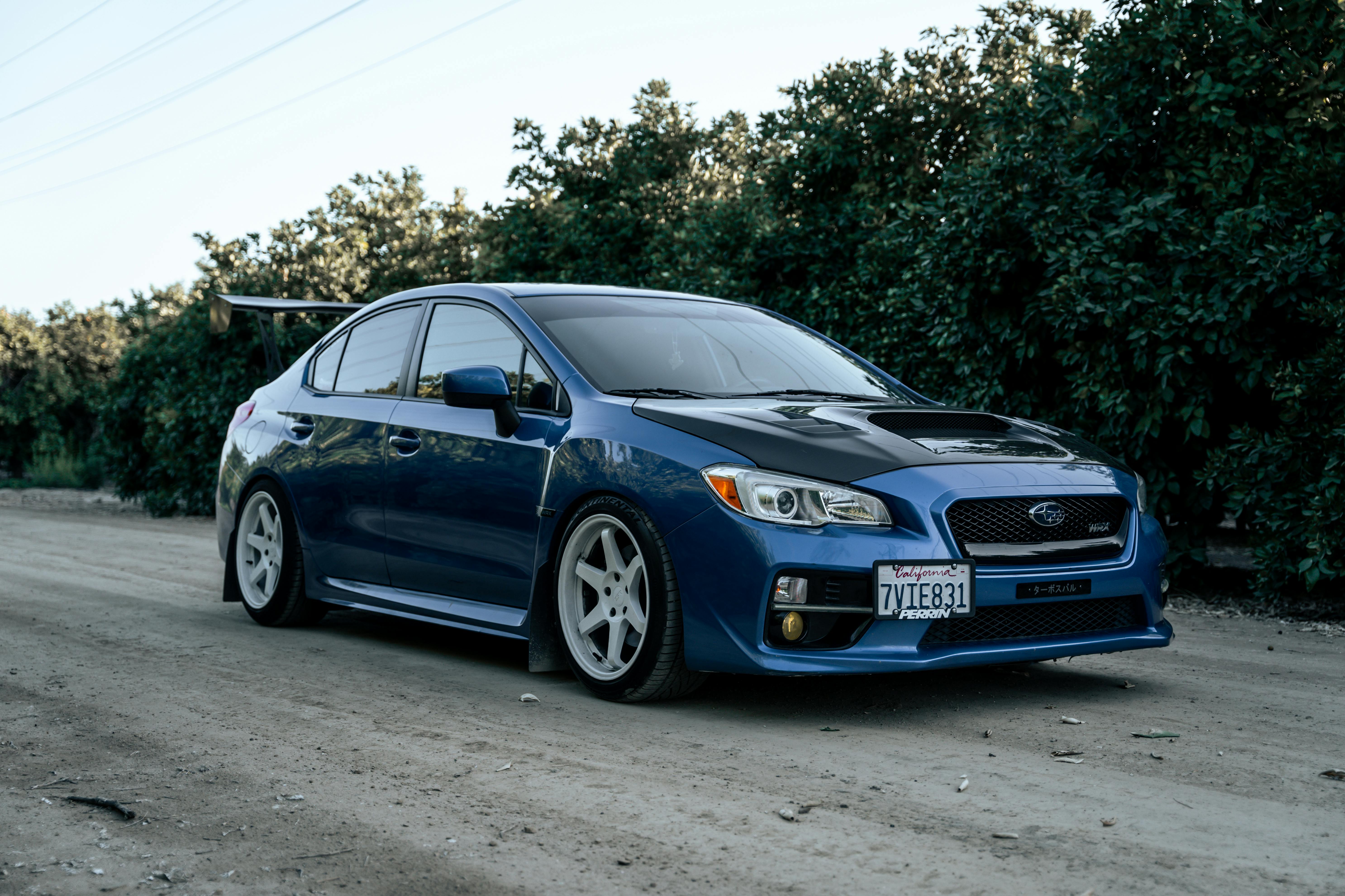 Blue Subaru on Road · Free Stock Photo